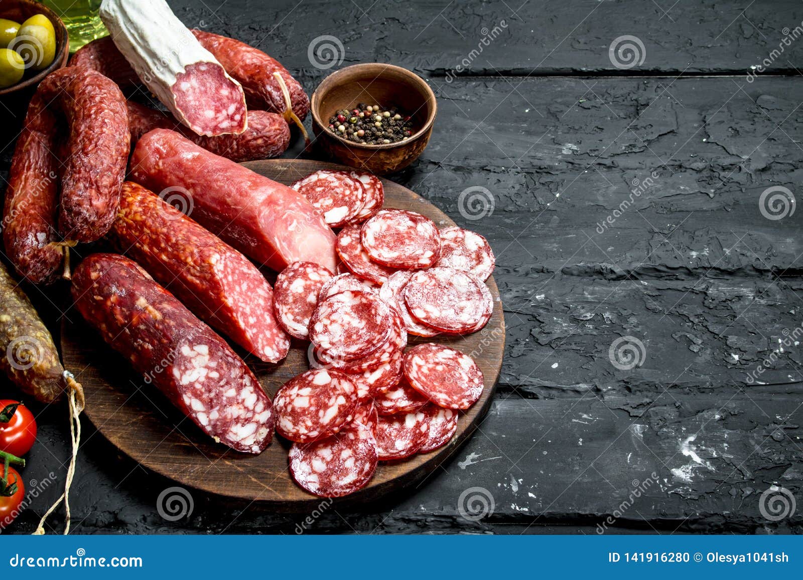 Different Types of Salami on the Board Stock Photo - Image of ...