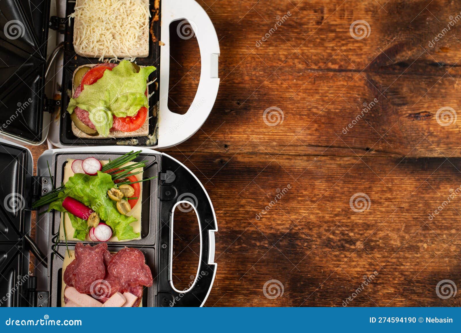 Different Types of Sandwiches in a Sandwich Maker on a Wooden ...