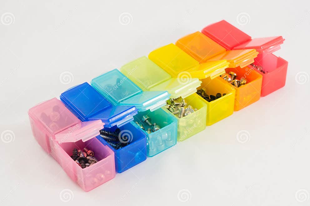 Different Types of Screws in Small Colored Plastic Containers. V Stock ...