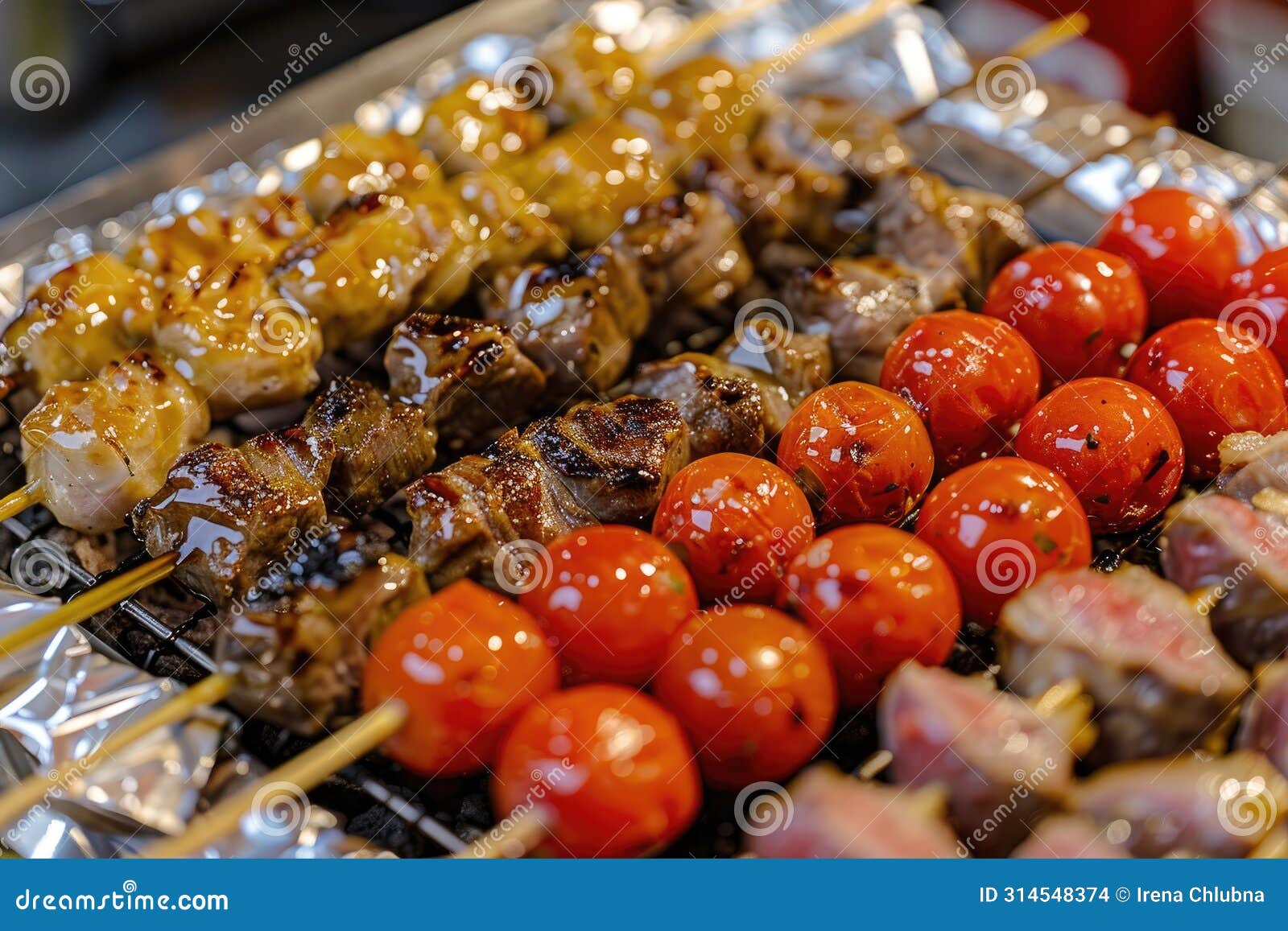 Different Types of Small Skewers with Meat and Cherry Tomatoes Being ...