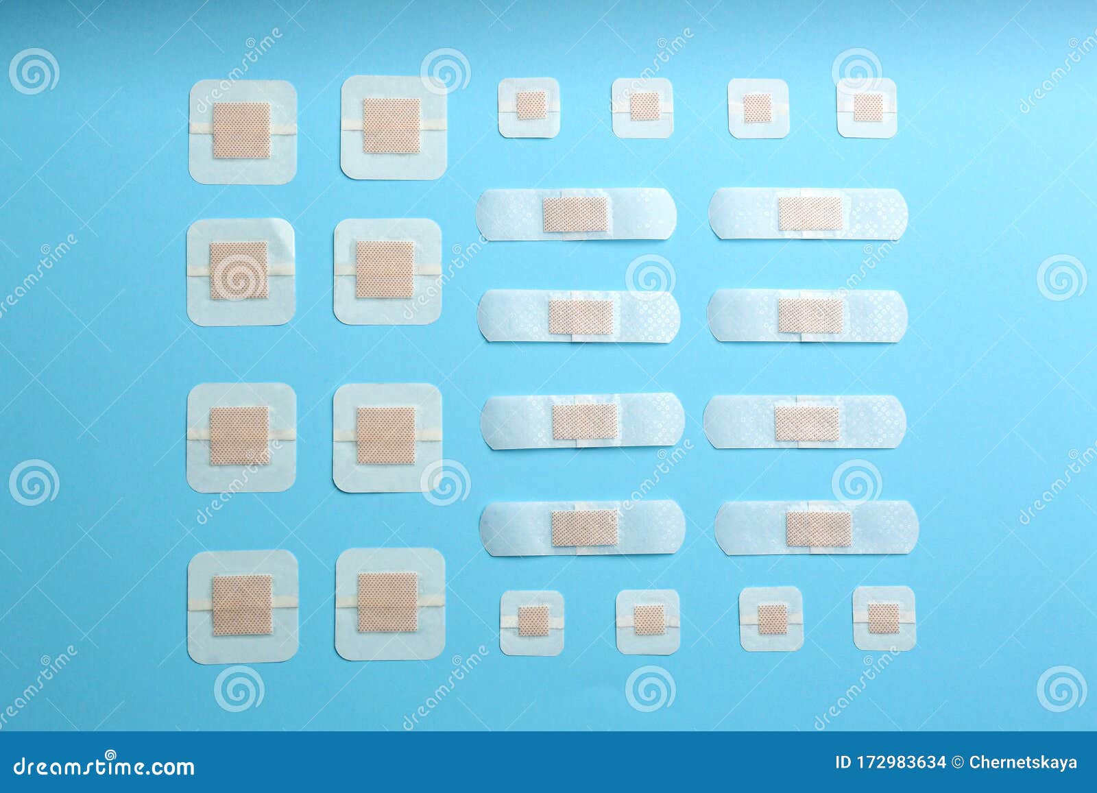 Different Types of Sticking Plasters on Blue Background, Flat Lay Stock ...