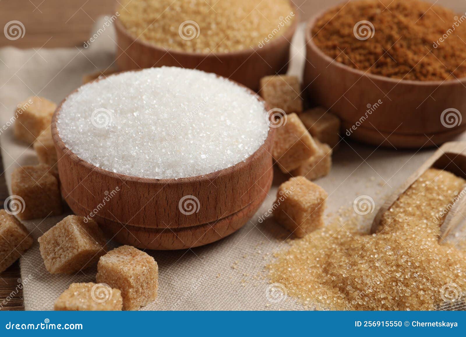 Different Types of Sugar in Granules and Cubes on Cloth, Closeup Stock ... Different Types of Sugar in Granules and Cubes on Cloth, Closeup Stock ...