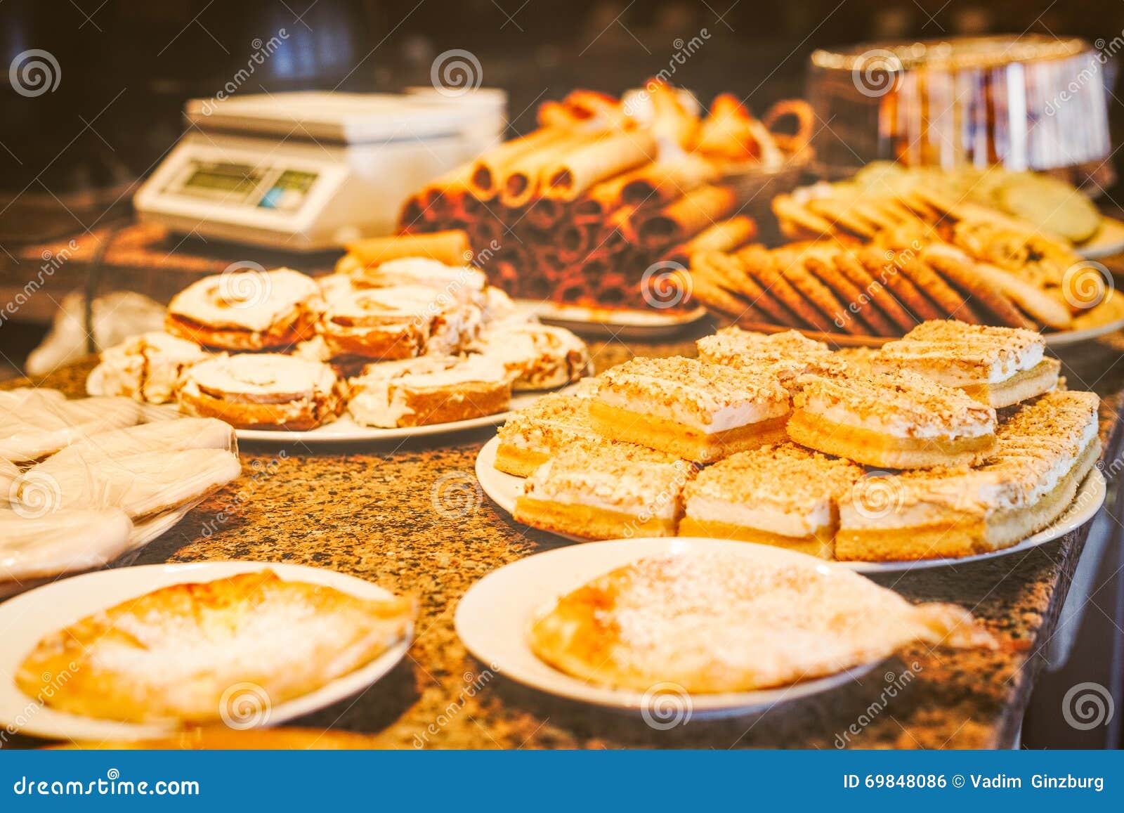 Different Types of Sweet Pastries on Plates Stock Photo - Image of ...