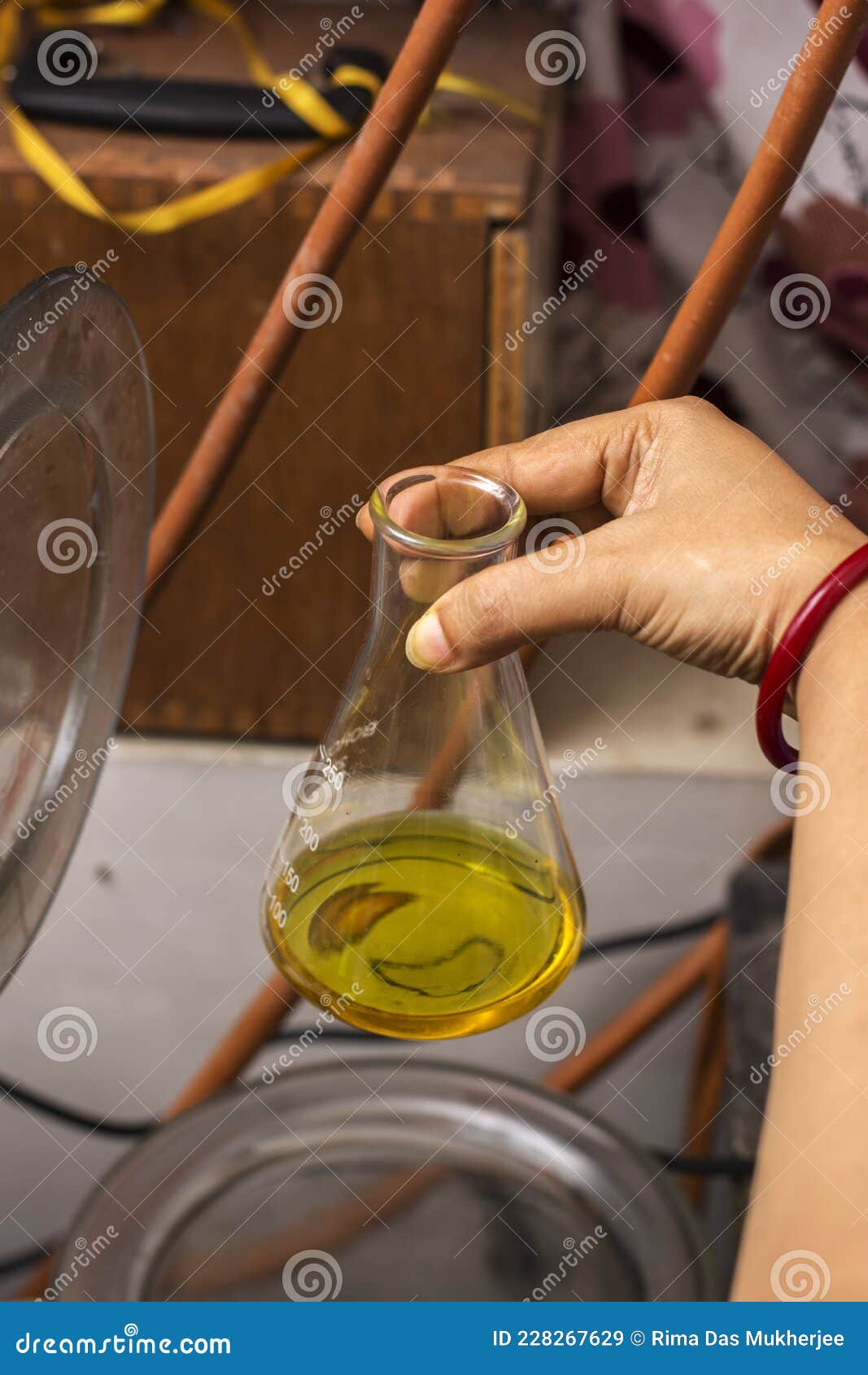 Different Types of Testing Jars or Tubes in Hand of a Female Scientist ...