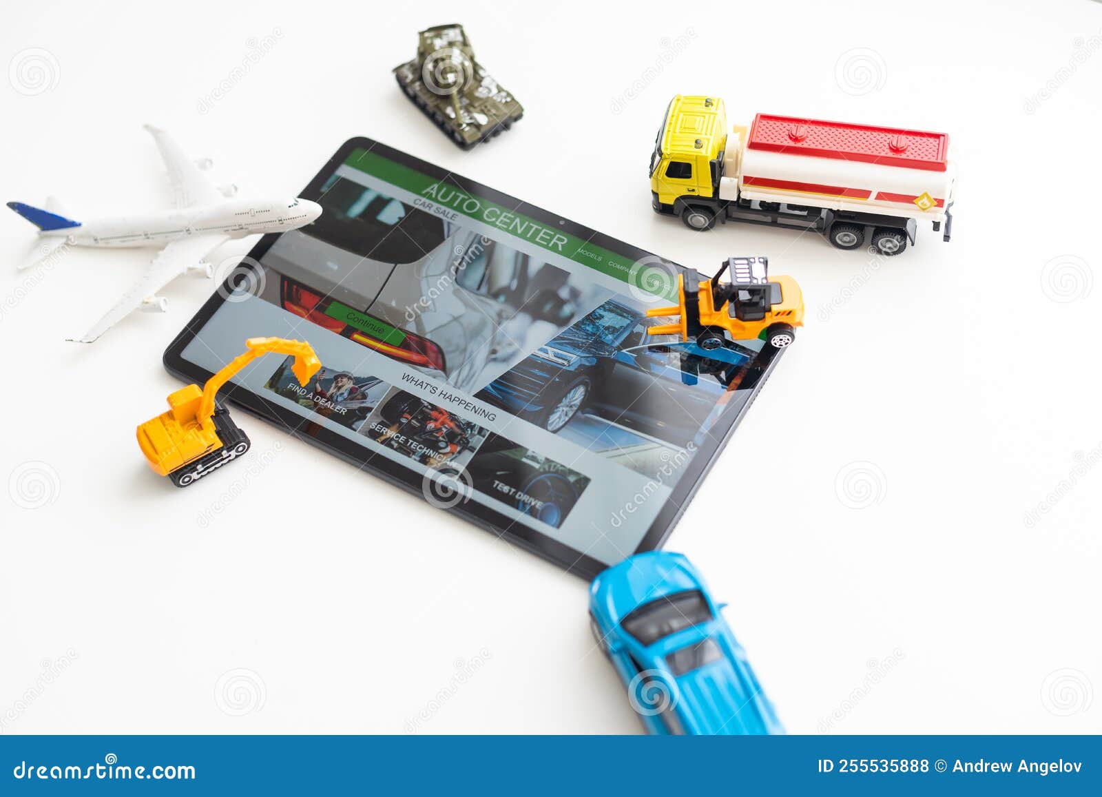 Different Types of Toy Transport and a Tablet Stock Photo - Image of ...