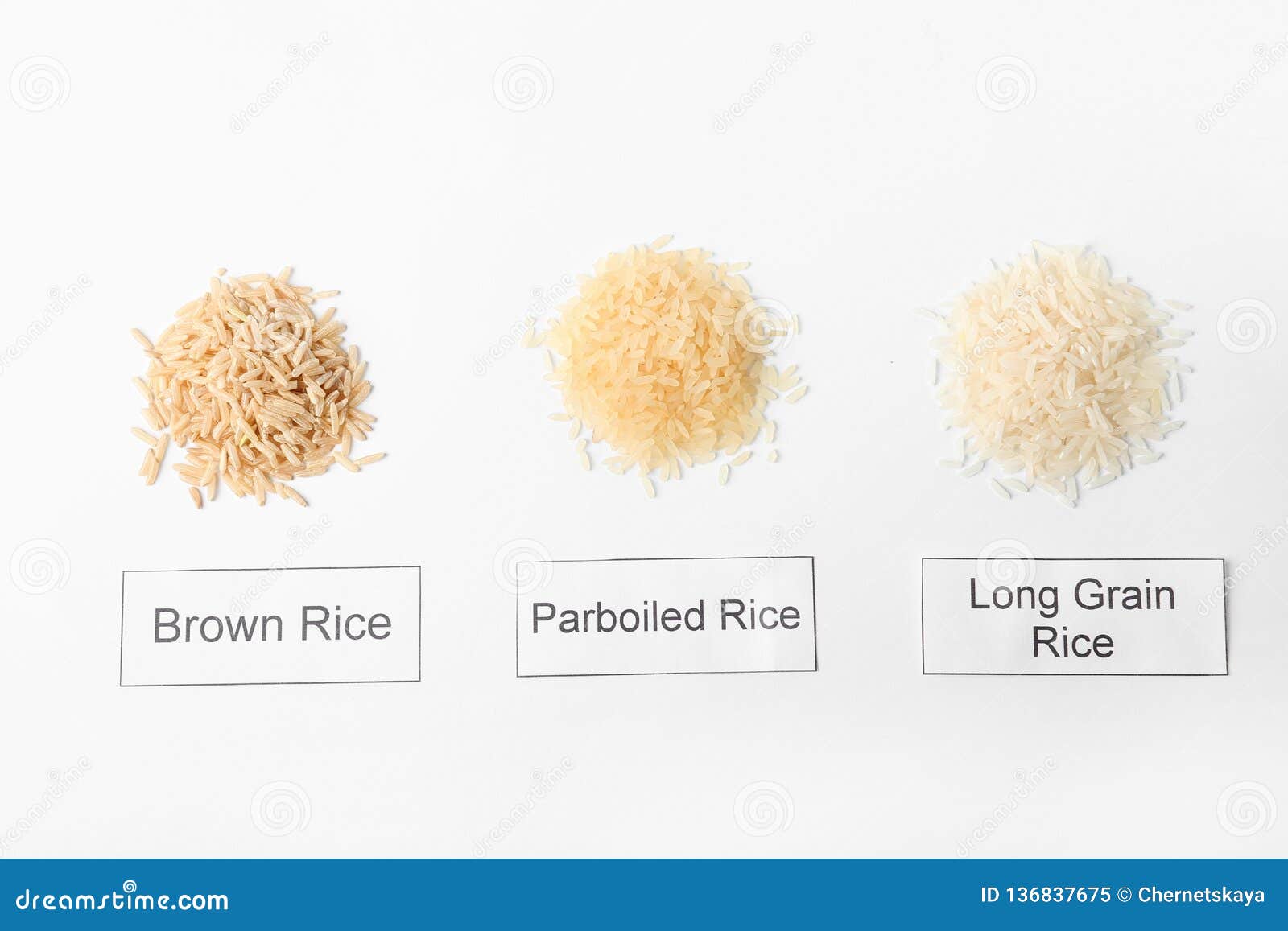 Different Types of Uncooked Rice and Cards on White Background Stock ...