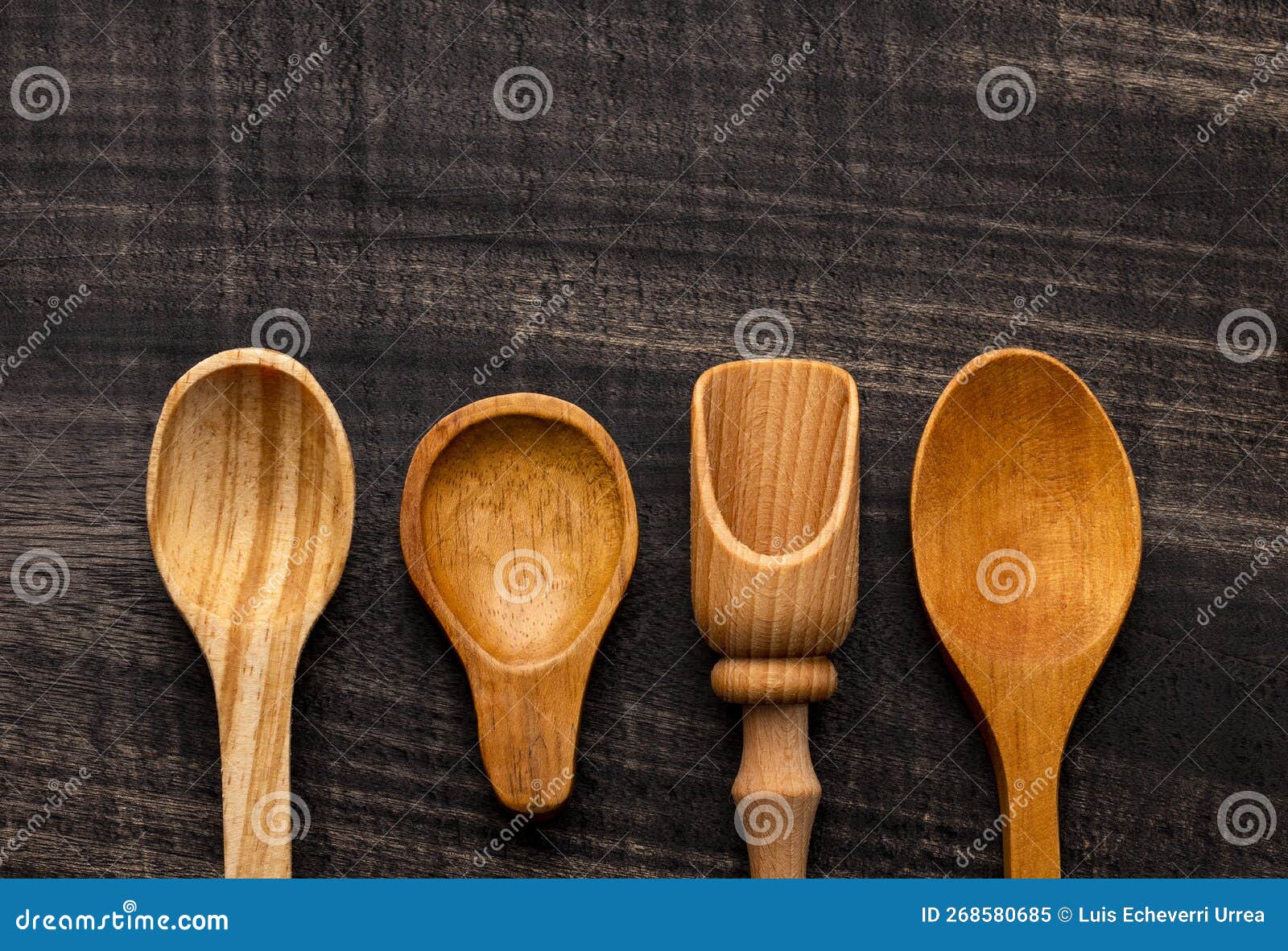 Different Types of Wooden Spoons on Dark Rustic Table - Kitchen ...