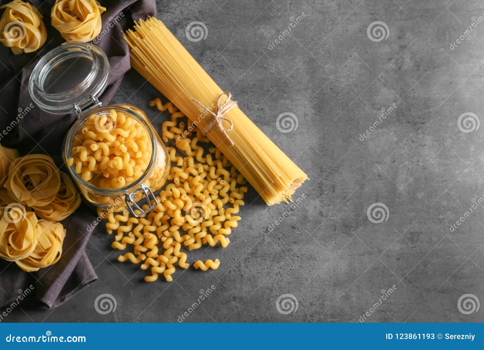 Different Uncooked Pasta on Grey Background Stock Image - Image of flat ...