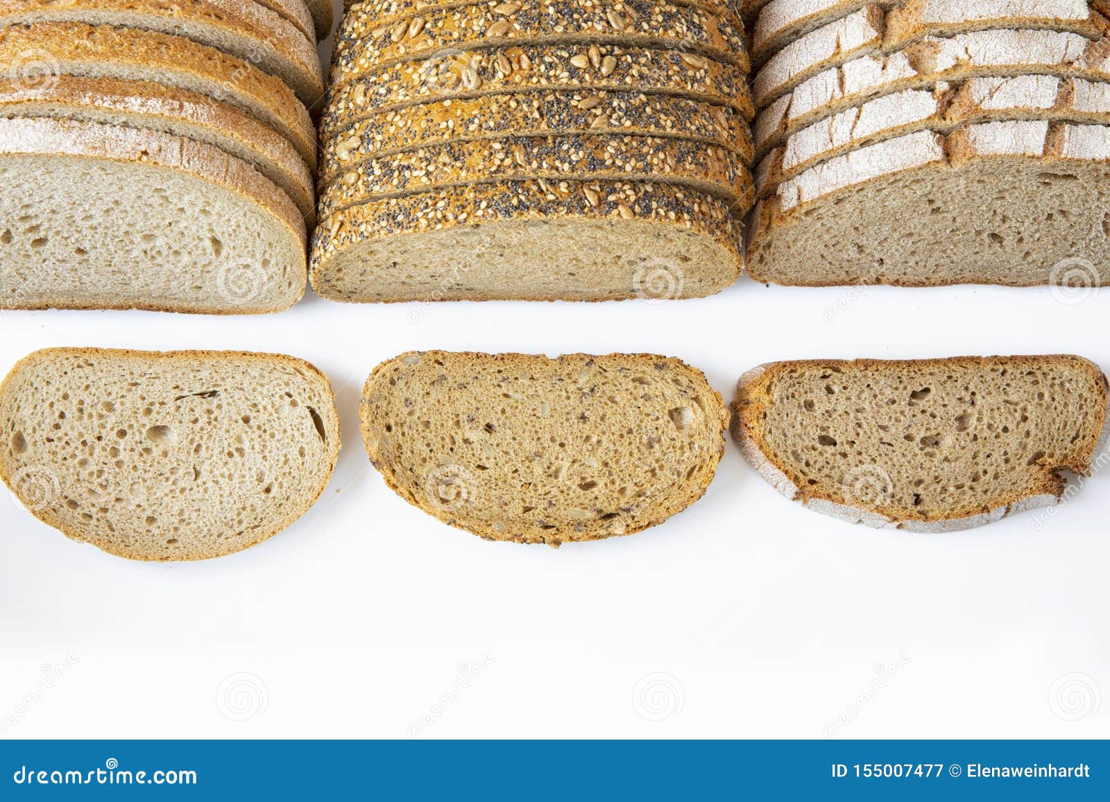 Different Varieties of Bread Cut into Slices on a White Background ...