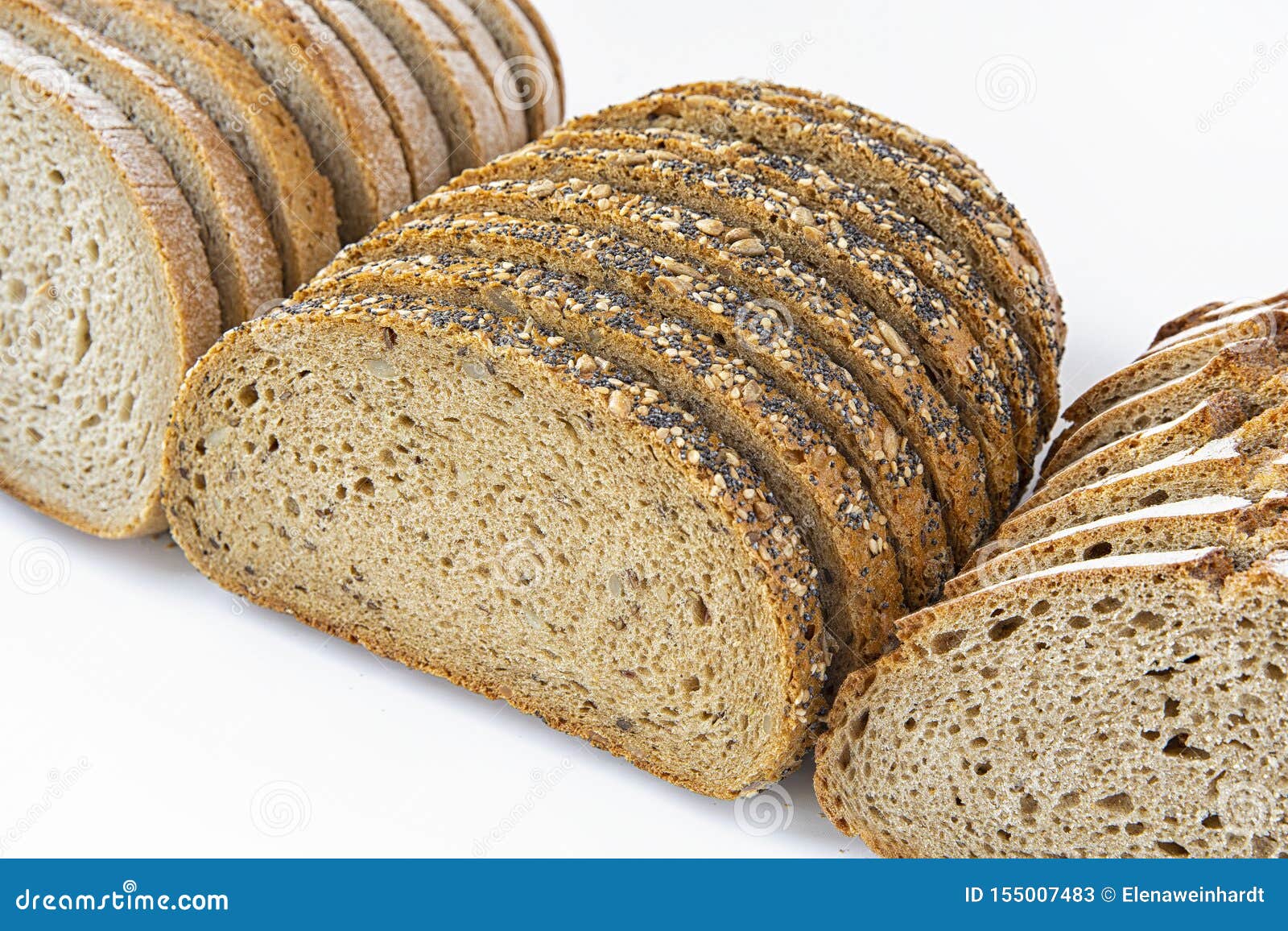 Different Varieties of Bread Cut into Slices on a White Background ...