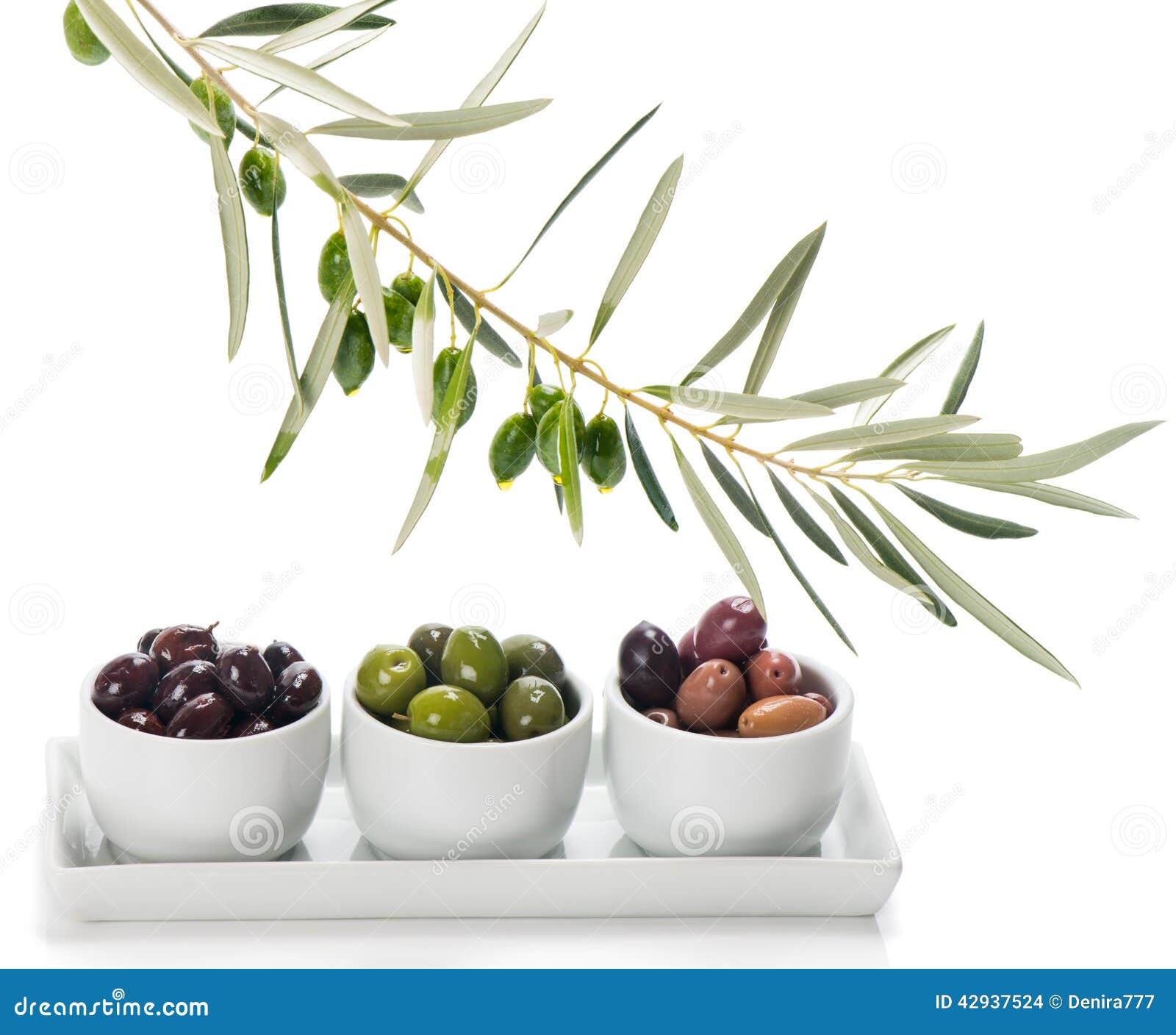 Different Varieties of Olives Marinated in White Bowls and Twig Stock ...