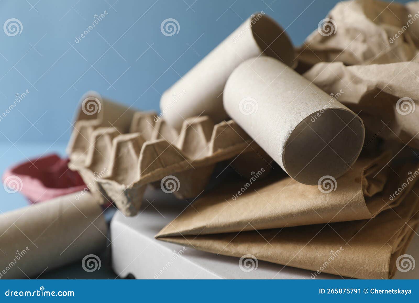 Different Waste Paper on Light Blue Background, Closeup Stock Image ...