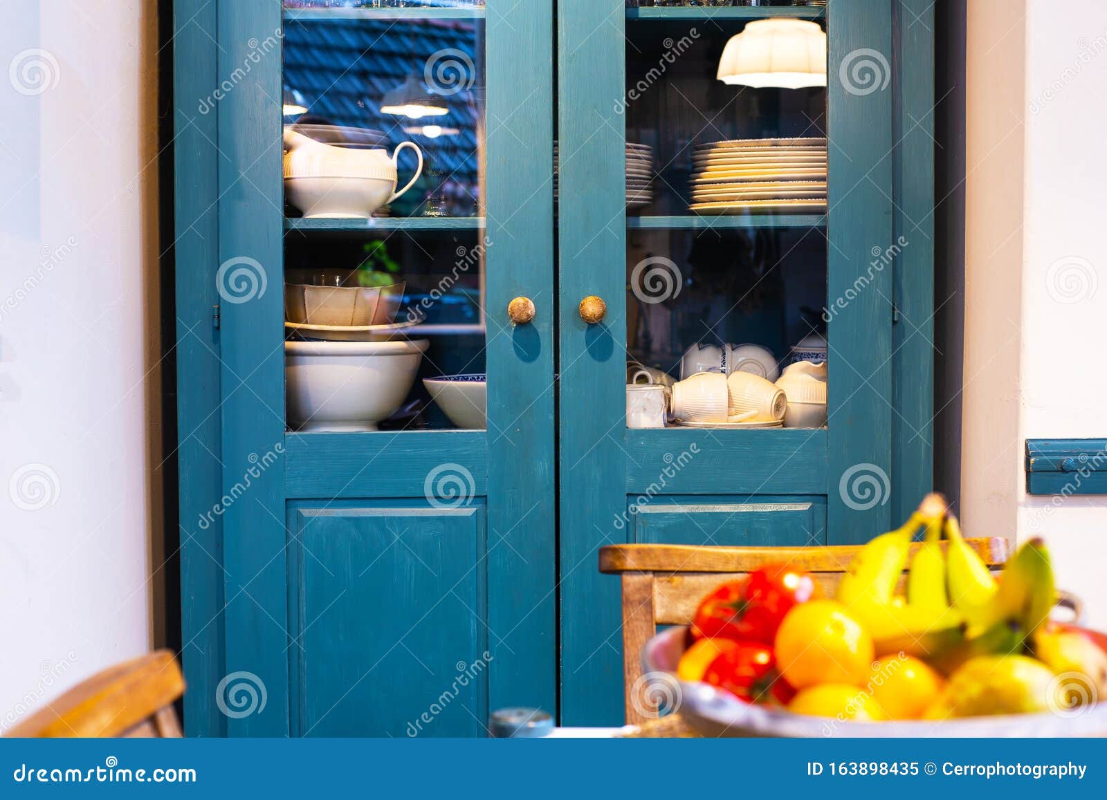Different White Dishes in Cupboard in the Kitchen Vintage Design with ...