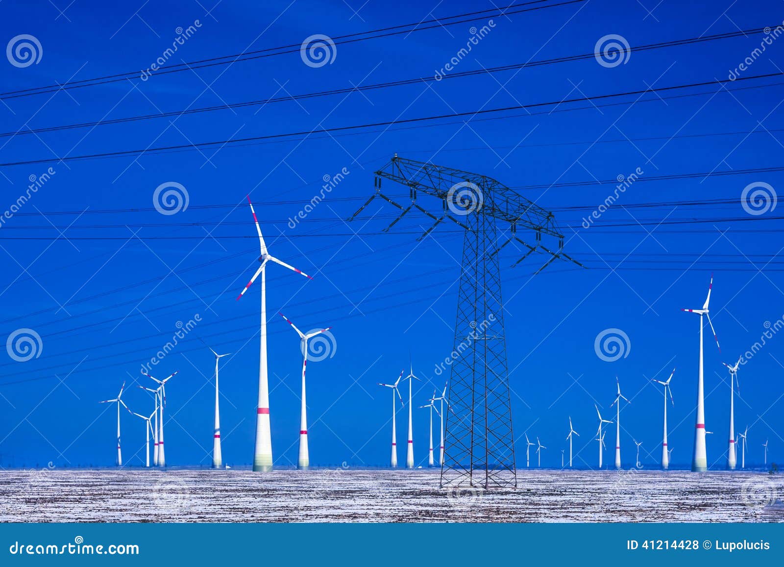 Different Windmills with Power Pole Transmission Line in Winter ...