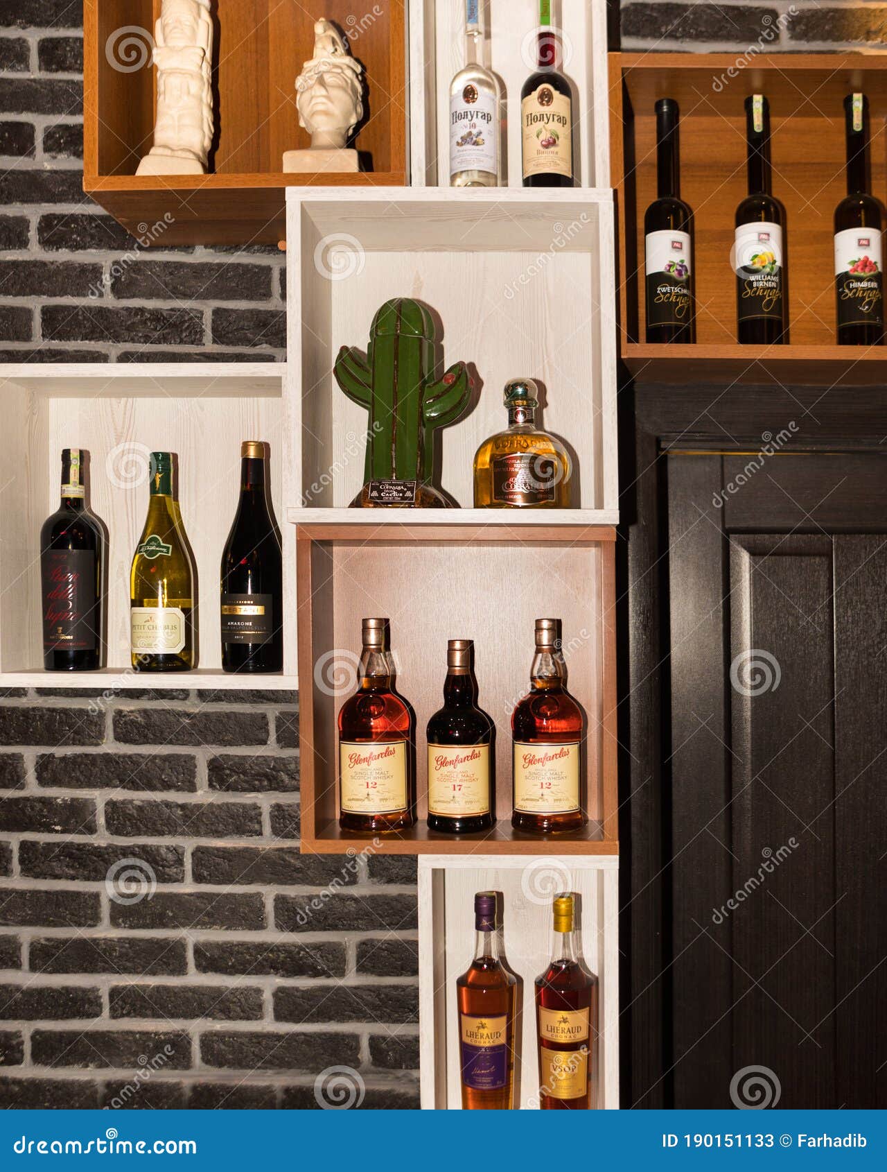 Different Wine Bottles at the Showcase, Pub Editorial Stock Photo ...