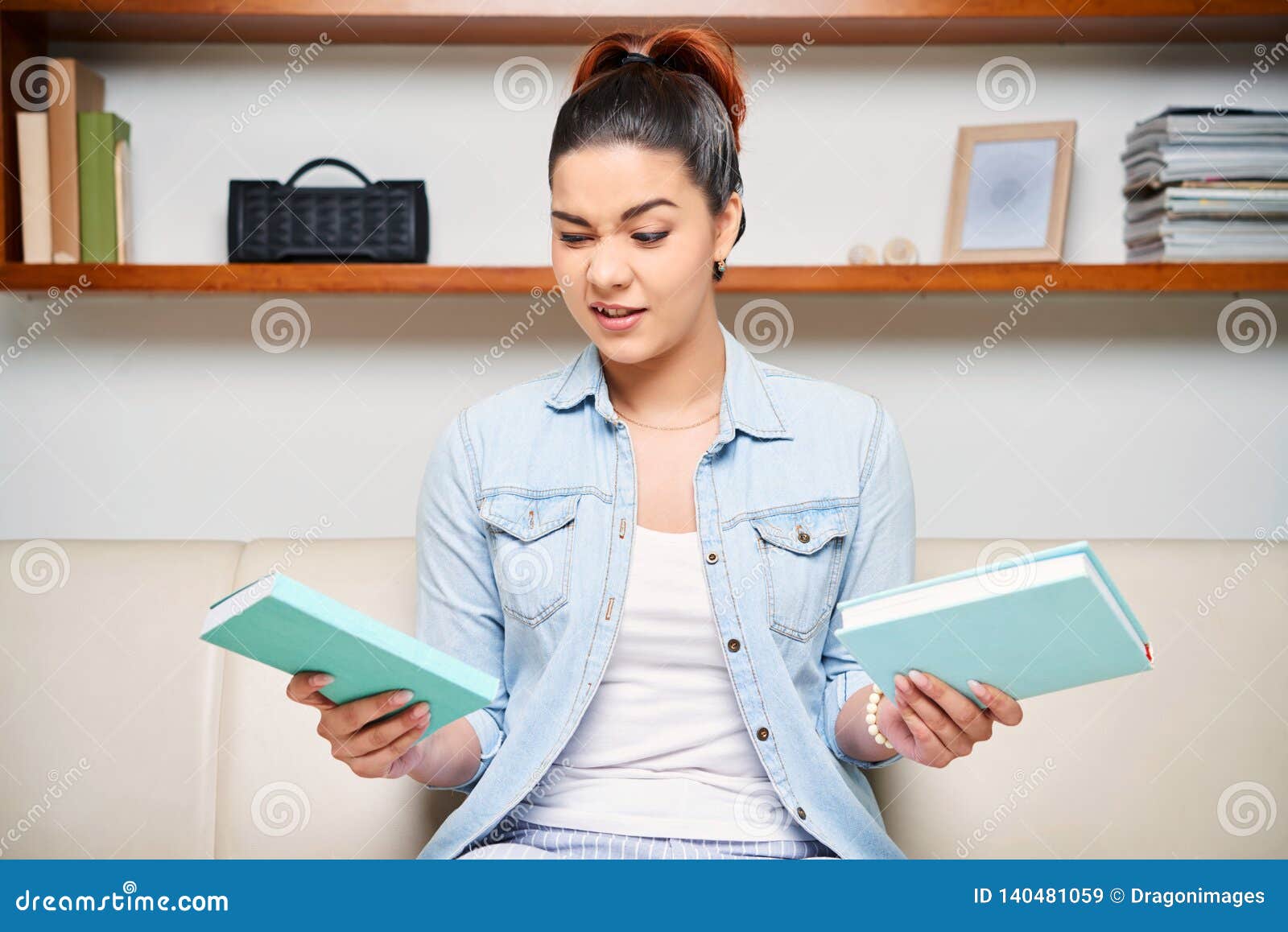 Difficult Choice between Two Books Stock Image - Image of sitting ...