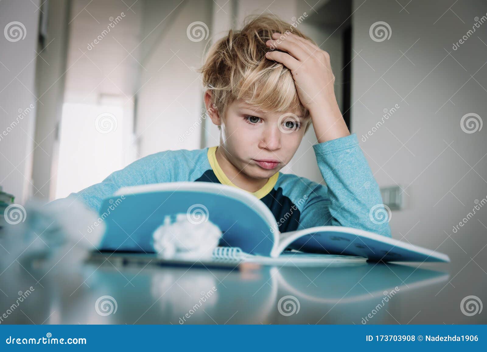 Difficult Homework- Little Boy Having Problems with Reading Stock Photo ...