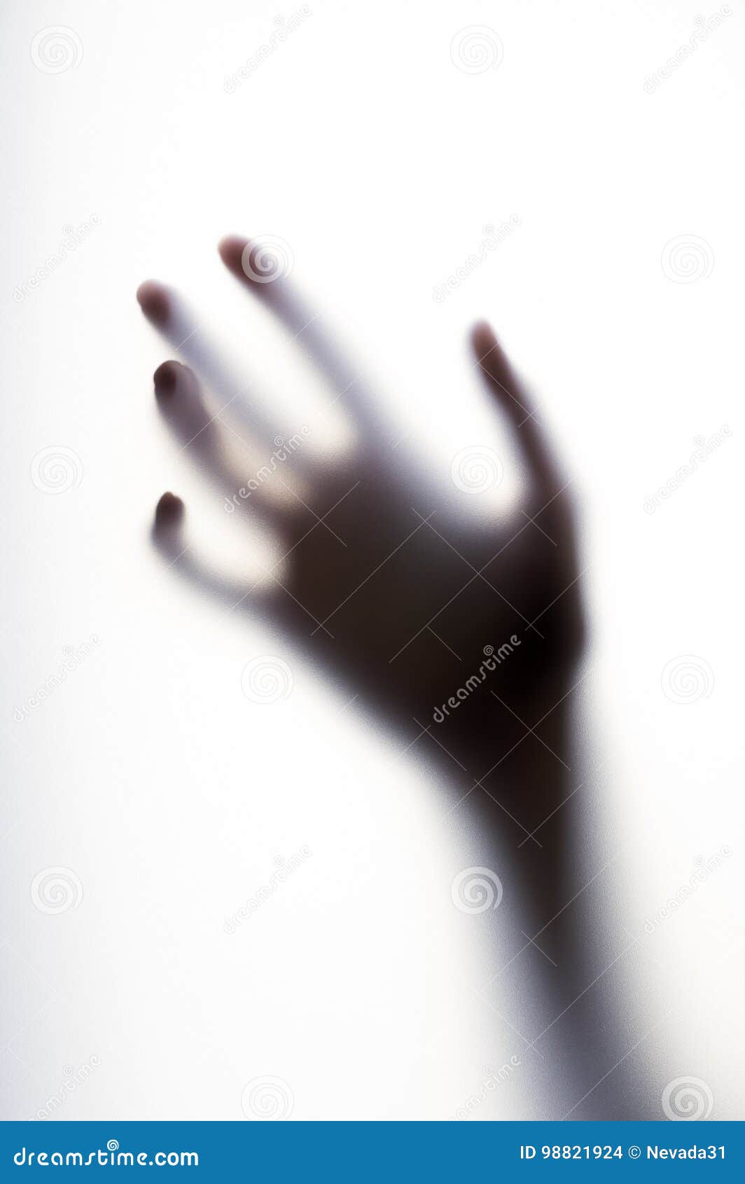 Diffused Shadow of Hand with Thin Fingers Behind the Frosted Glass ...