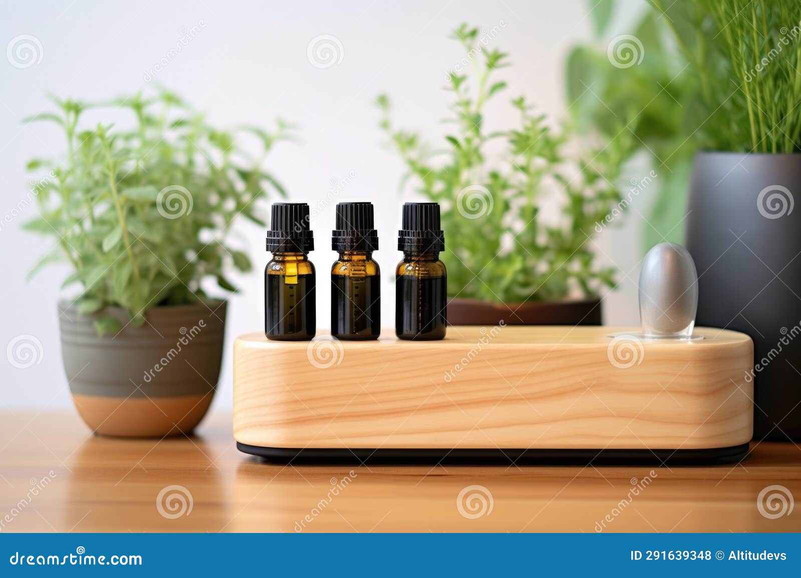 A Diffuser with Essential Oils on a Wooden Shelf Stock Photo - Image of ...