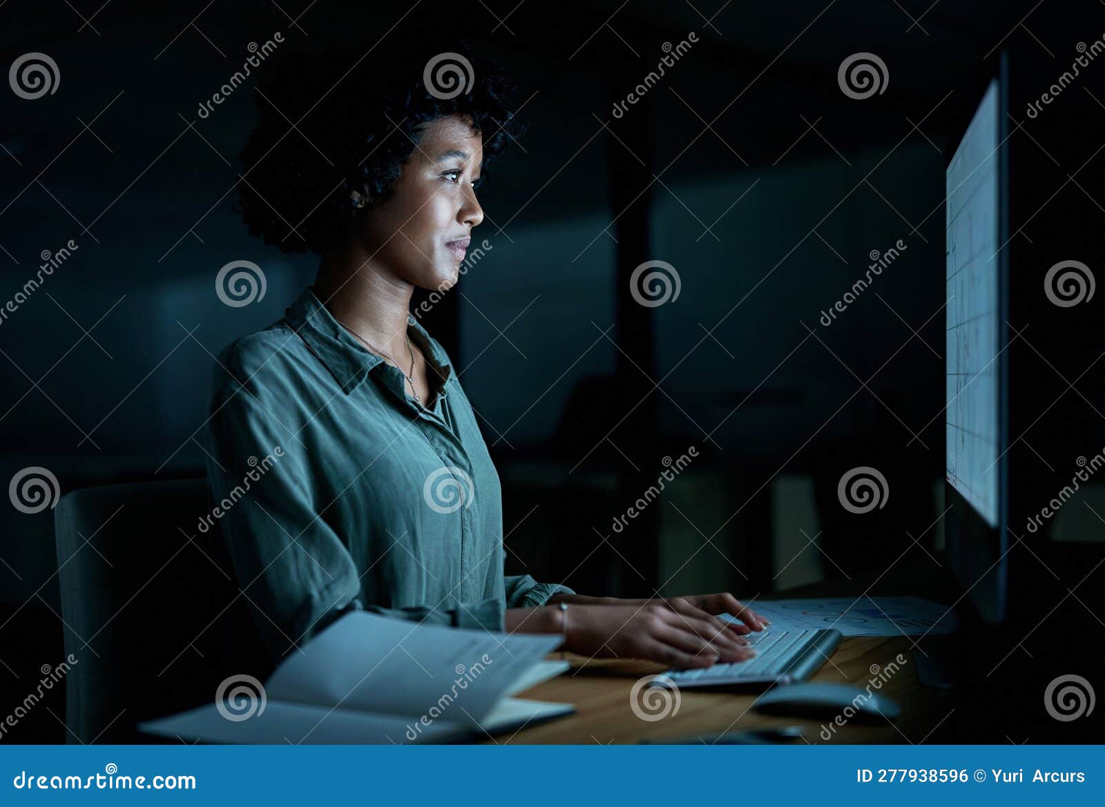 Dig Deep and Get Things Done. a Young Businesswoman Using a Computer ...