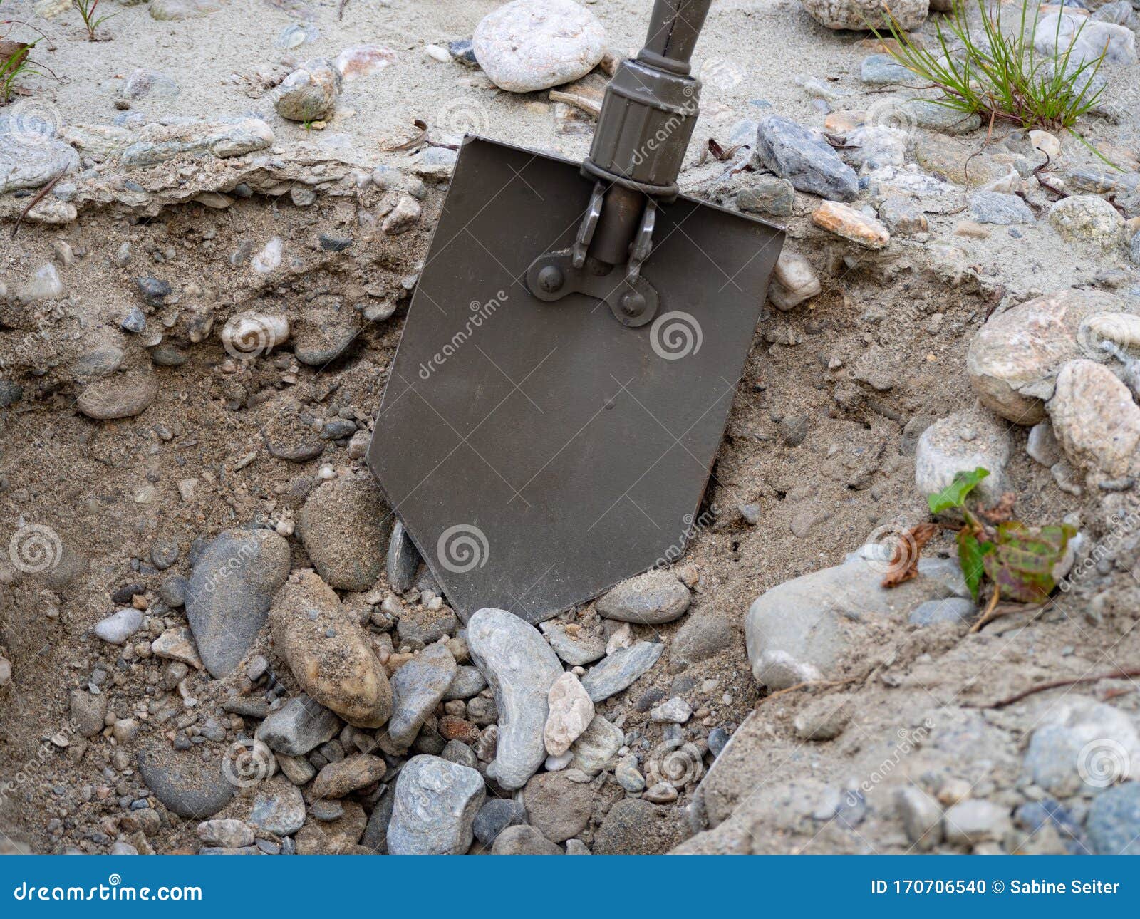 Dig a hole with a spade stock photo. Image of environment - 170706540