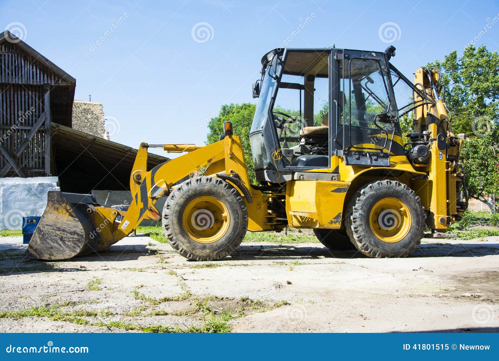 Digger in a backyard stock image. Image of heavy, excavate - 41801515