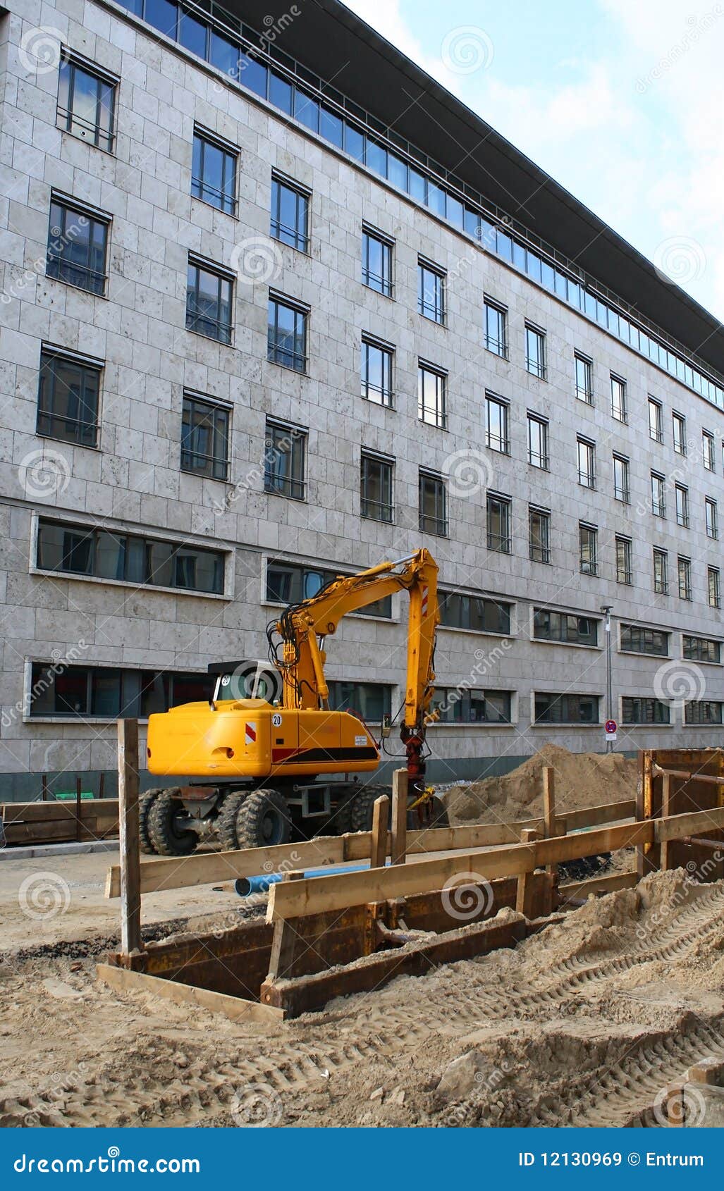 Digger on building site stock image. Image of heap, loading - 12130969