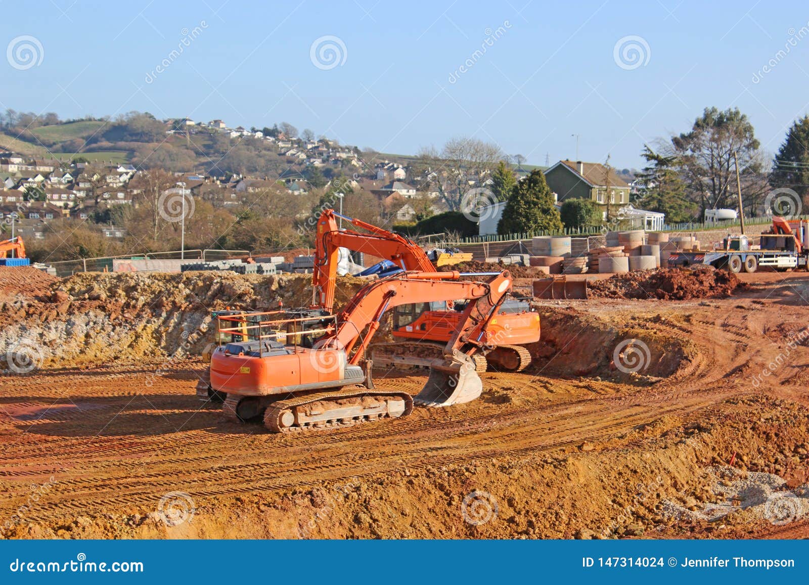 Digger on a Construction Site Stock Photo - Image of machinery, diggers ...