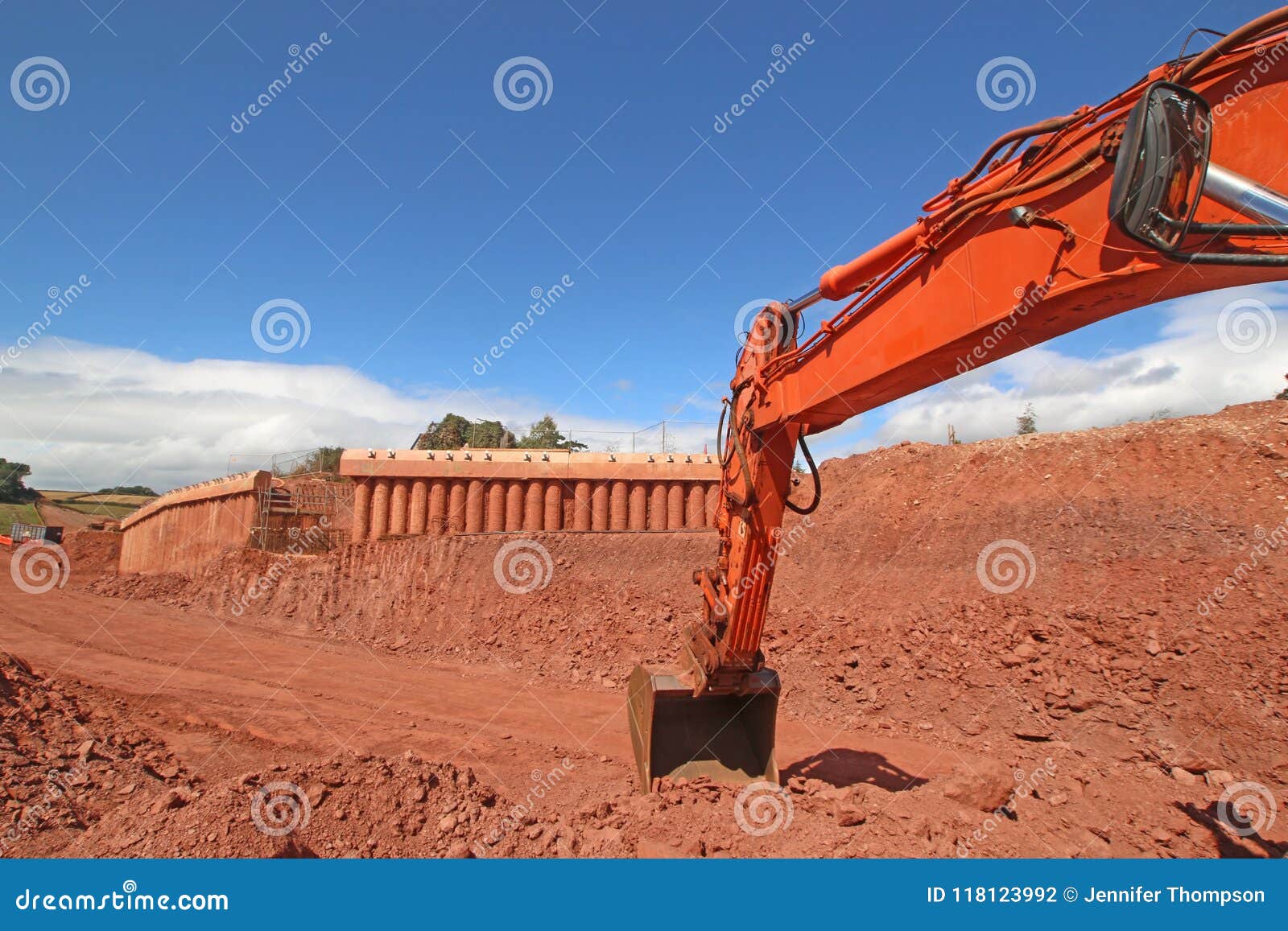 Digger on a Construction Site Stock Photo - Image of earth, plant ...