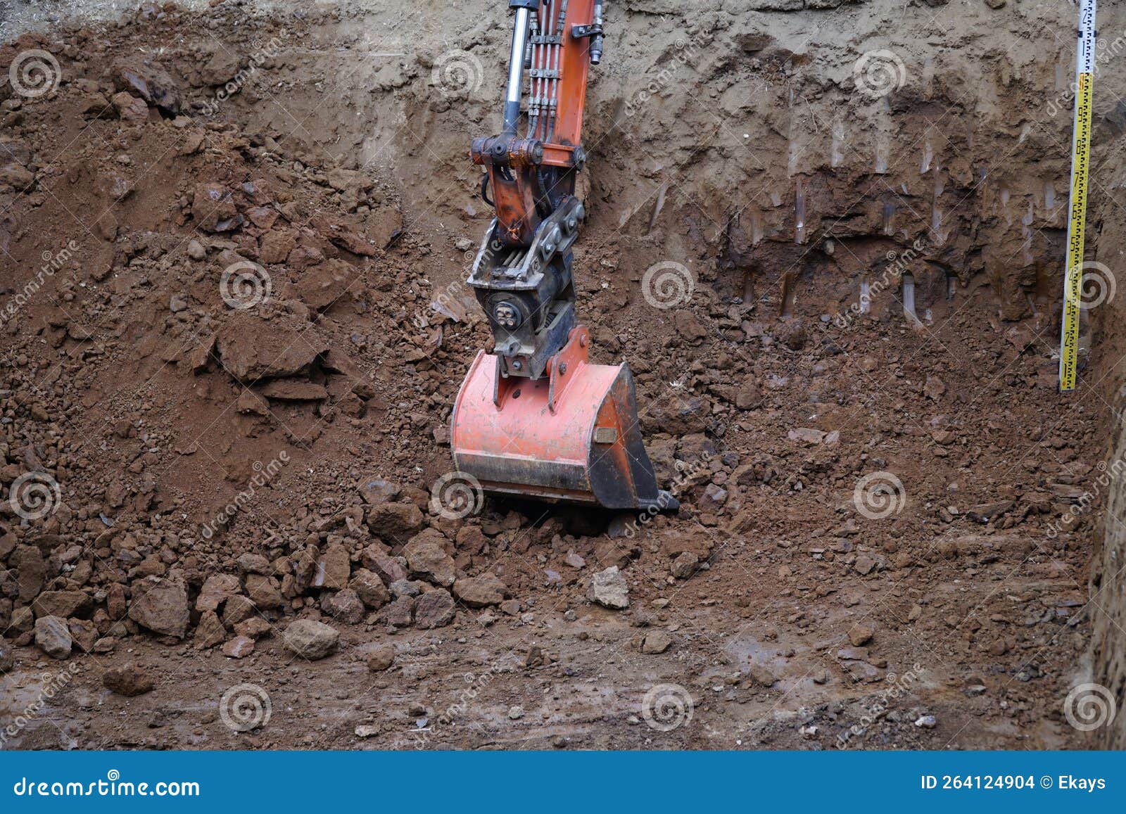 Digger digging out dirt stock photo. Image of measuring - 264124904