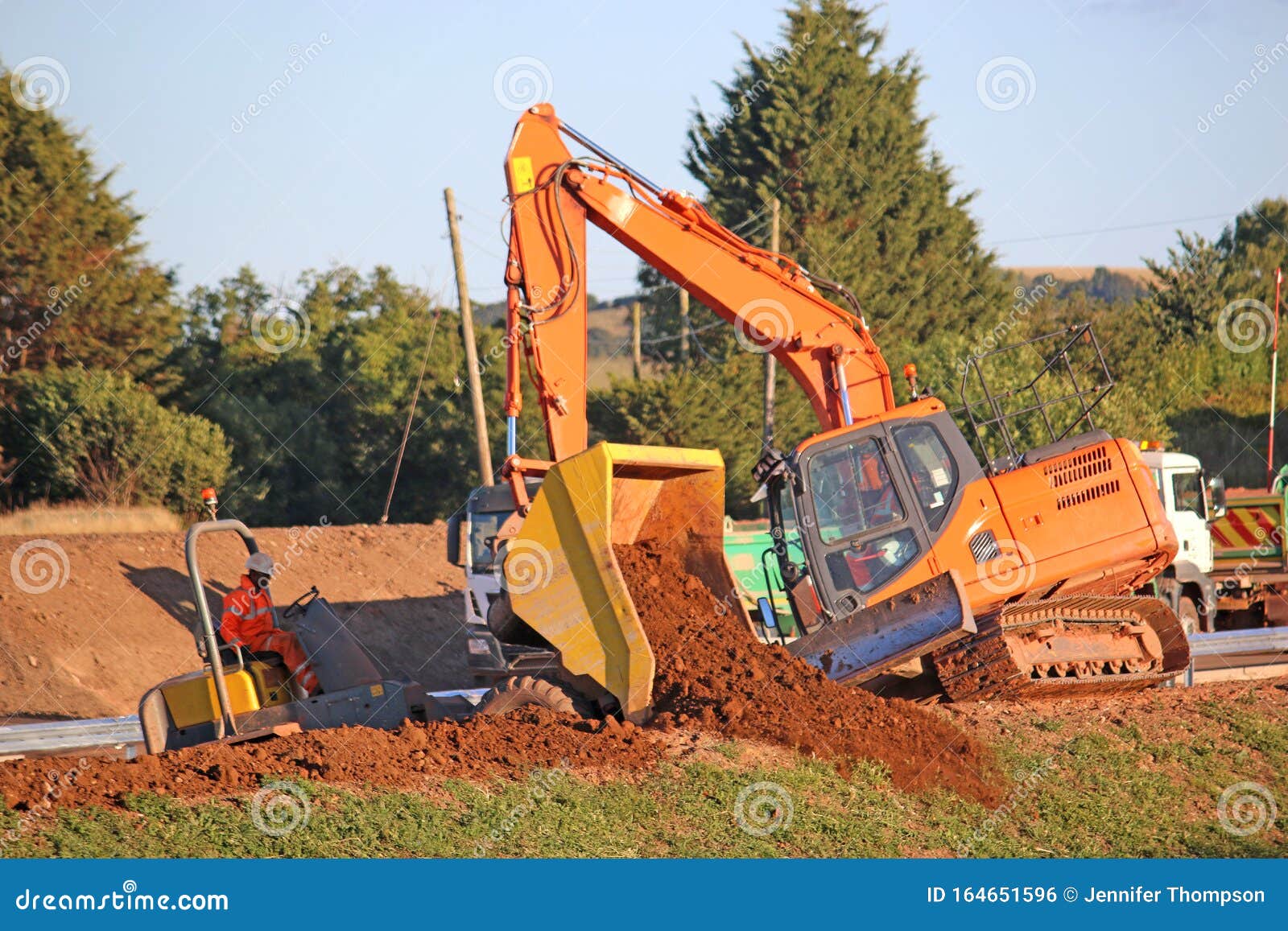 Digger on a Road Construction Site Stock Photo - Image of devon ...
