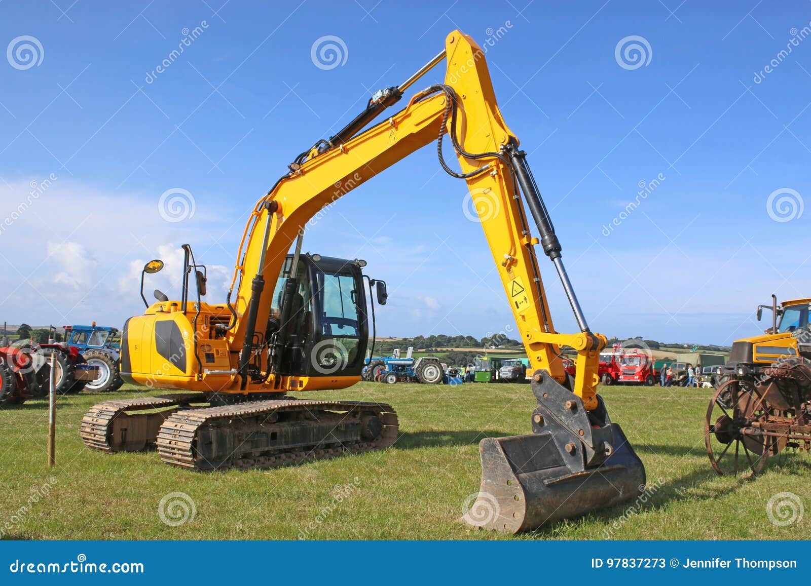 Digger in a field stock image. Image of farm, earth, swing - 97837273