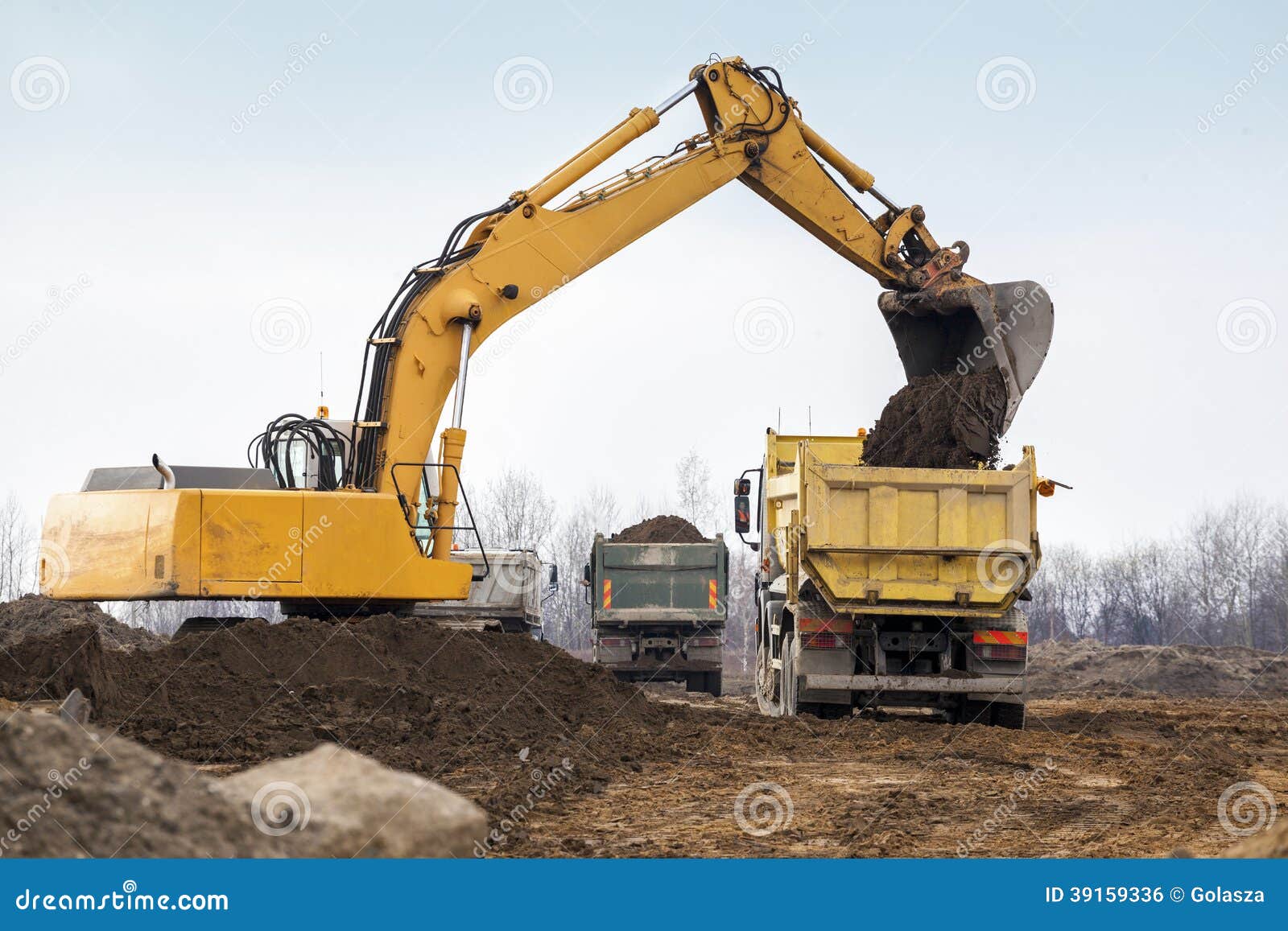 Digger Loading Trucks with Soil Stock Photo - Image of digger, load ...