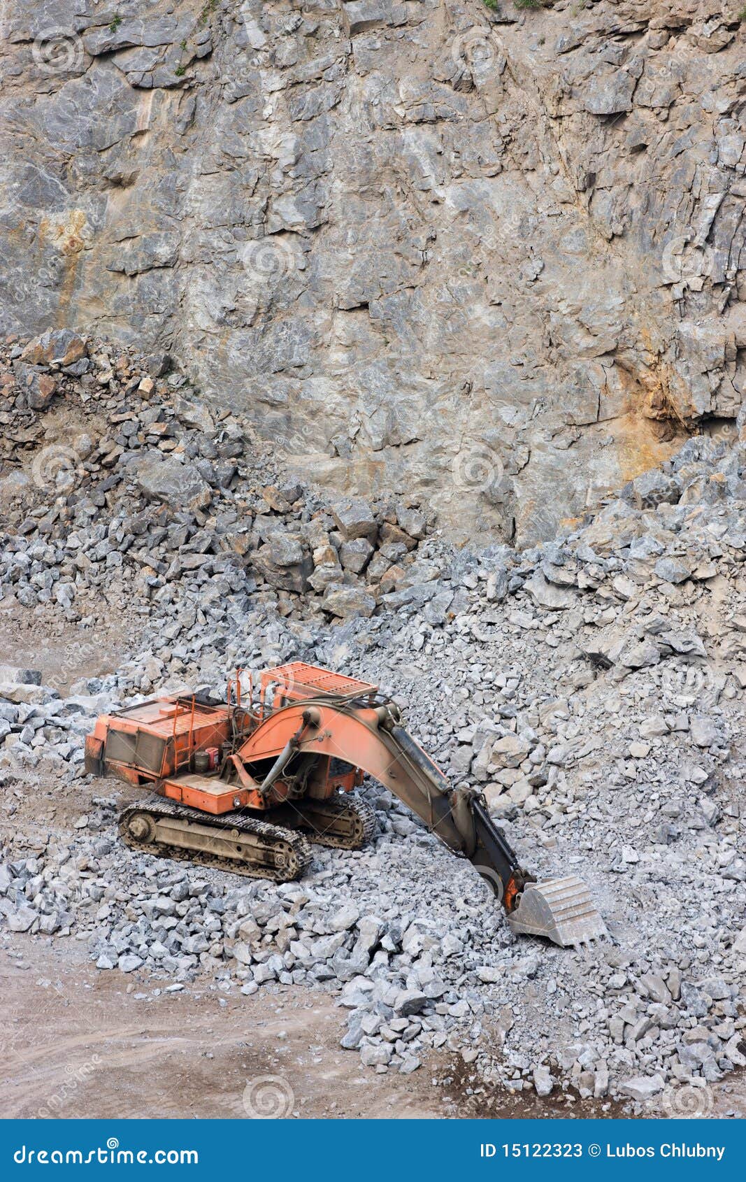 Digger in a quarry stock image. Image of industrial, rock - 15122323