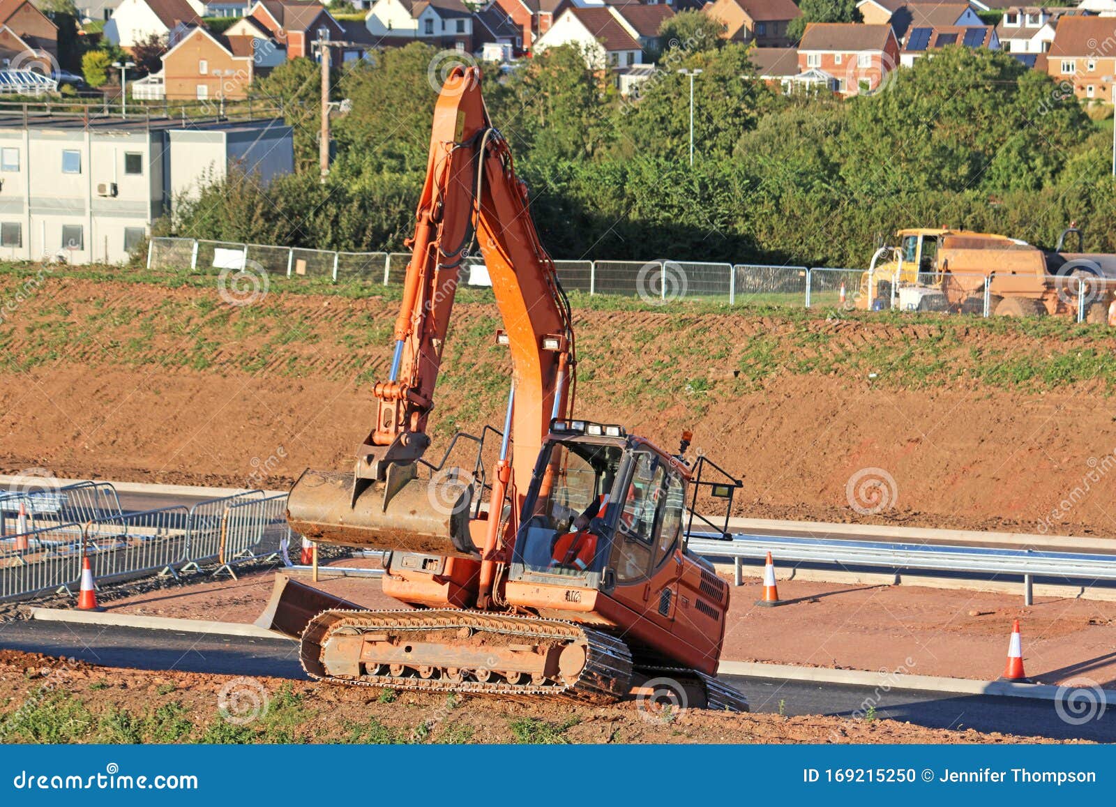 Digger on a Road Construction Site Stock Photo - Image of stone ...