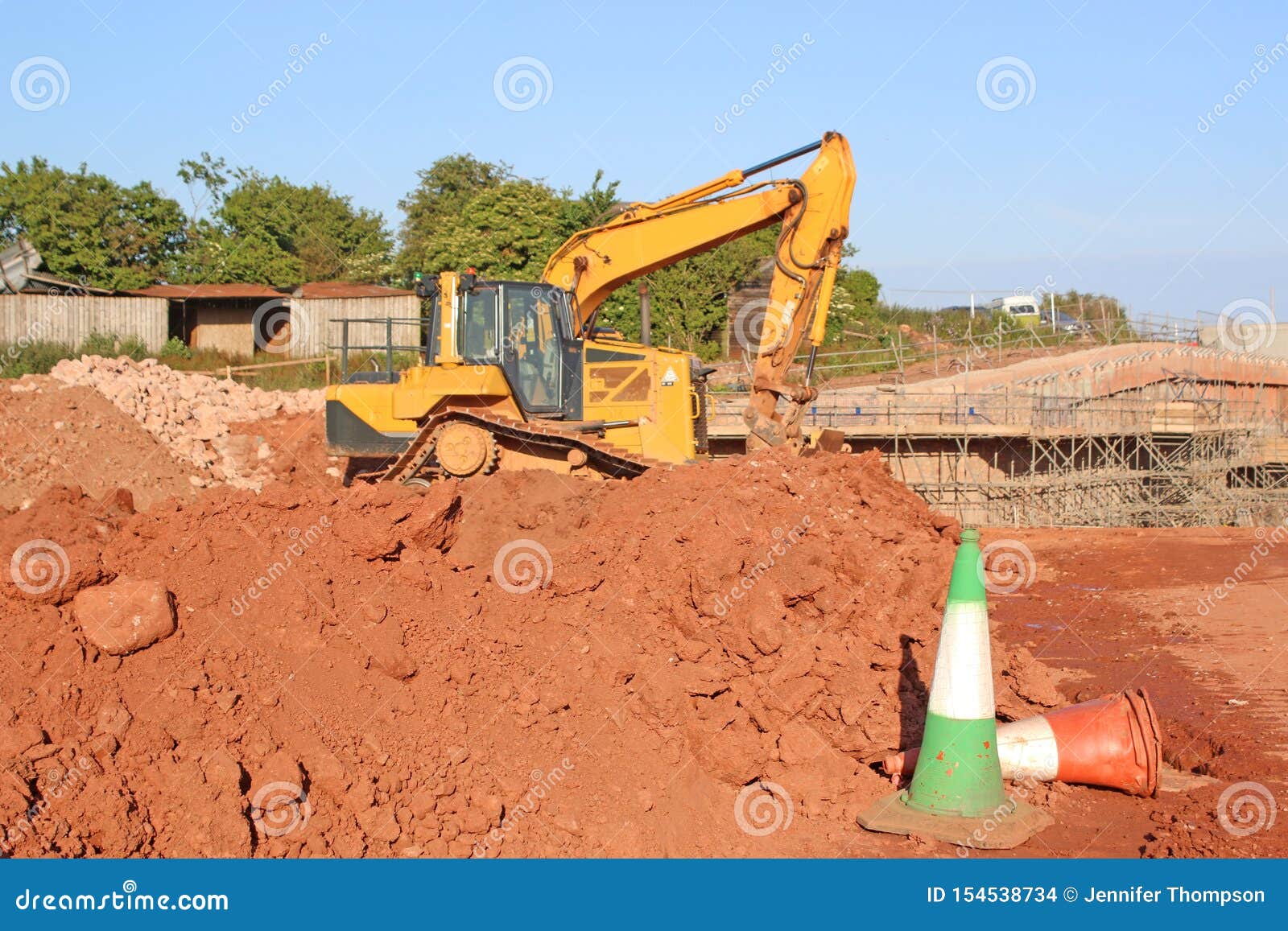 Digger on a Road Construction Site Stock Photo - Image of road, rural ...