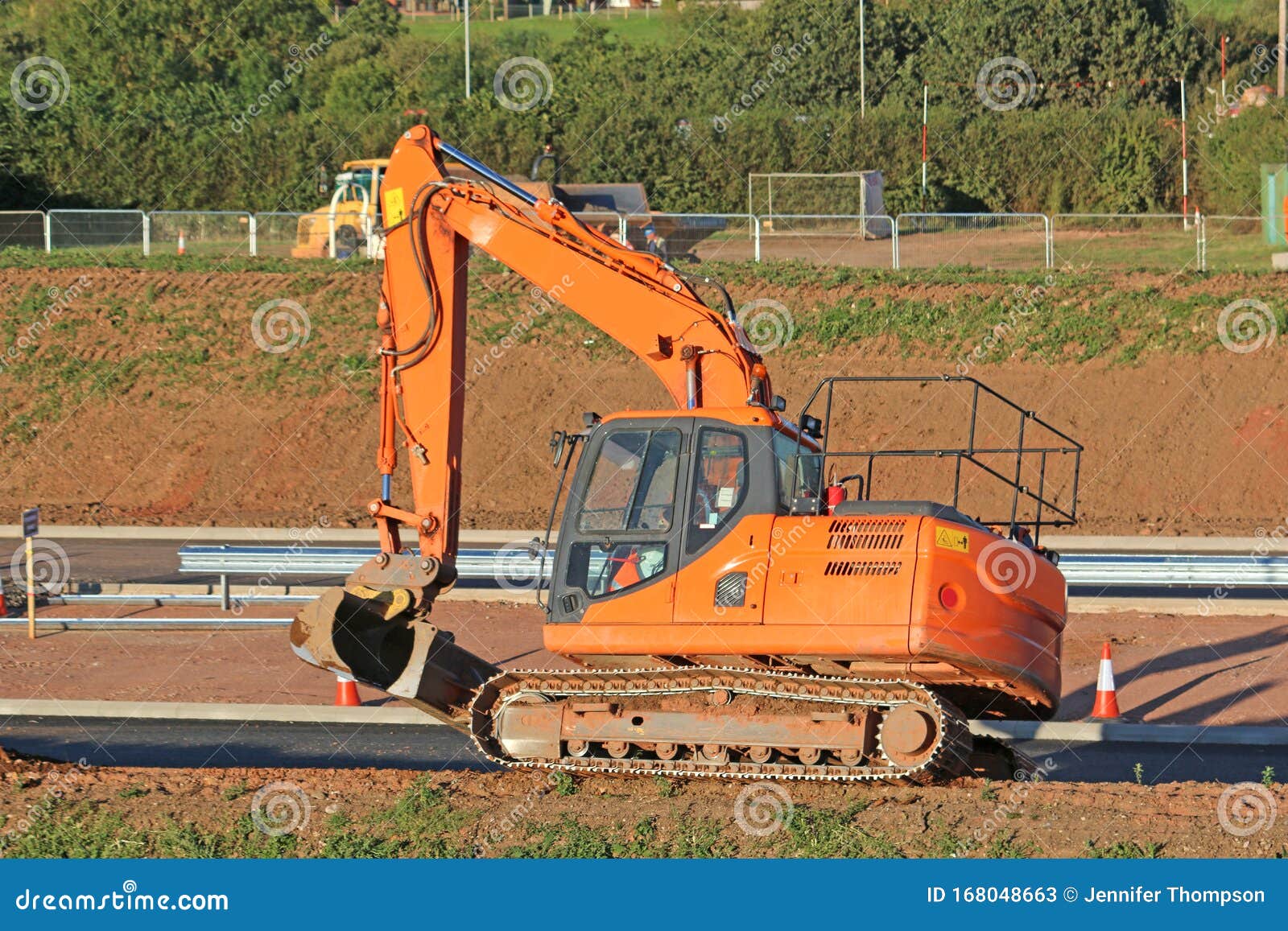 Digger on a Road Construction Site Stock Image - Image of working ...