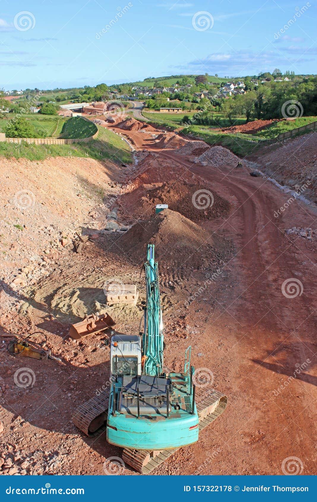 Digger on a Road Construction Site Stock Photo - Image of building ...