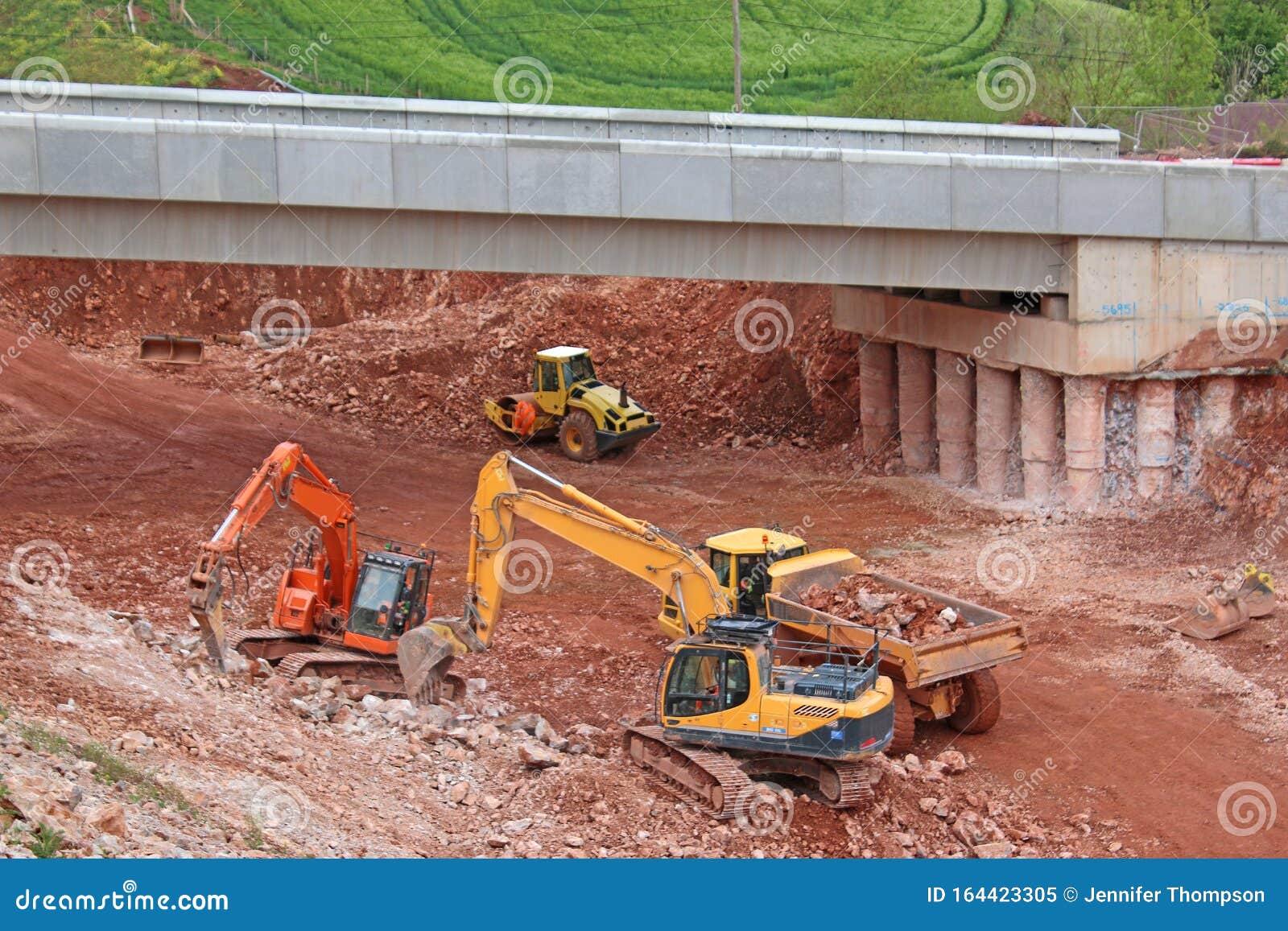 Diggers on a Road Construction Site Stock Image - Image of barriers ...