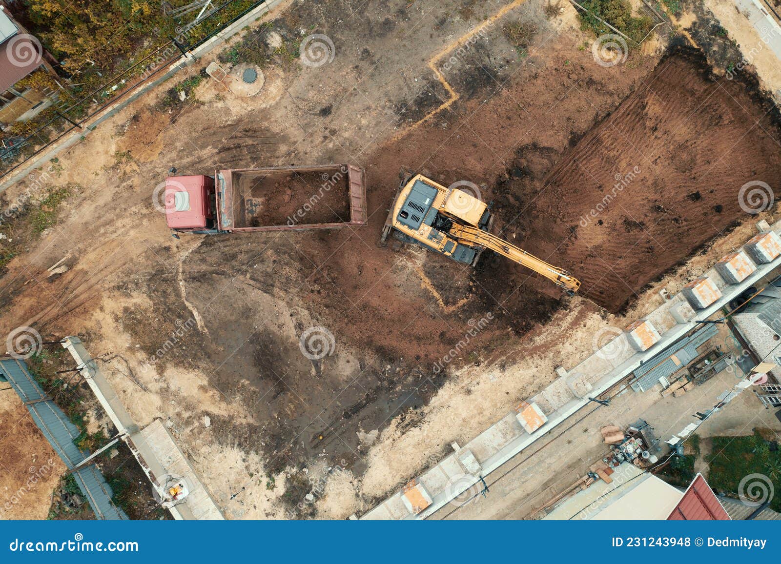 Digging The Pit Foundation A Hole With Excavator At The Construction ...