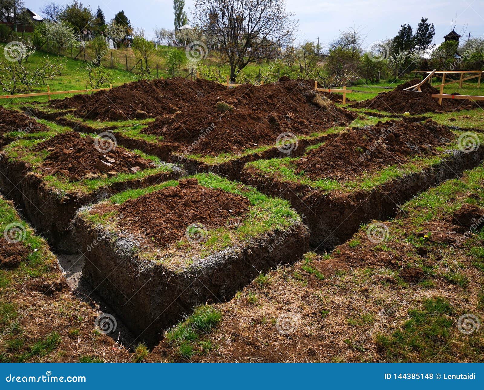 Digging in the Ground for Building the Foundation Stock Photo - Image ...