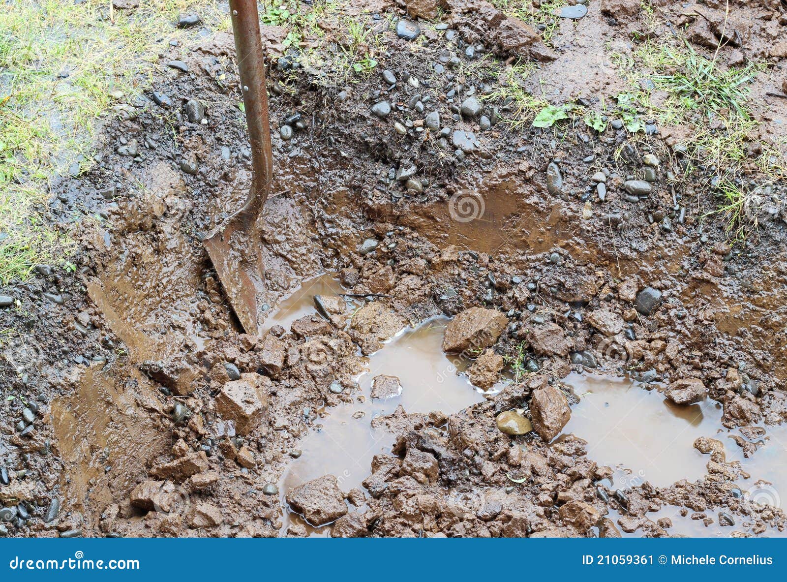 Digging a hole in the mud stock image. Image of drainage - 21059361