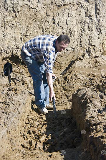Digging house foundations stock photo. Image of caucasian - 4985982