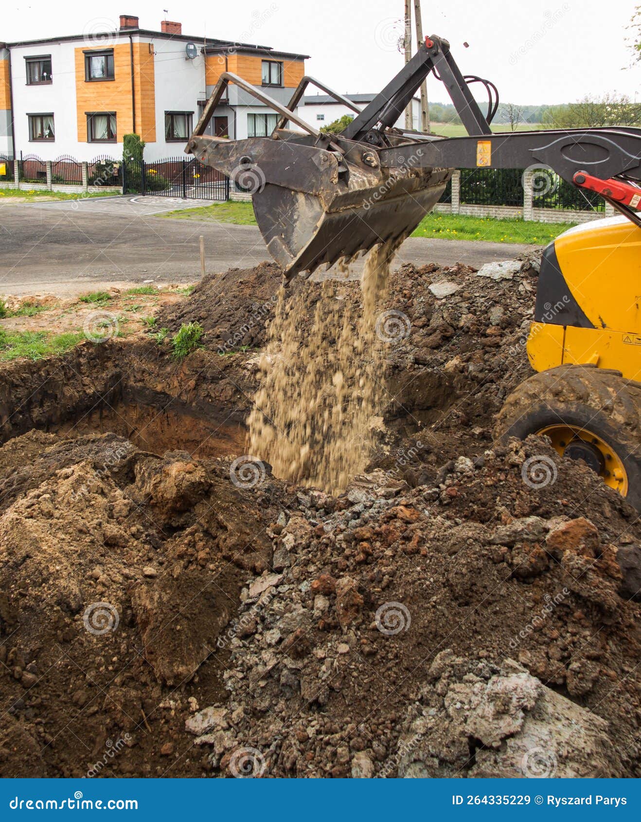 Digging and Leveling the Bottom of the Backyard Septic Tank Stock Image ...
