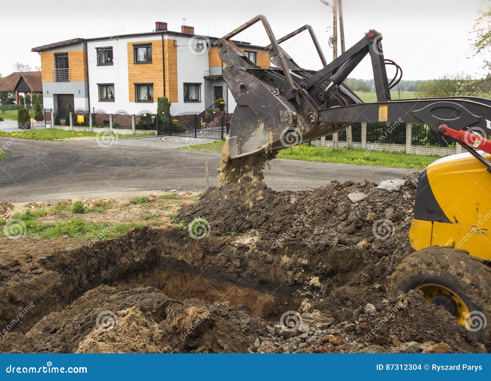 Digging and Leveling the Bottom of the Backyard Septic Tank Stock Photo ...