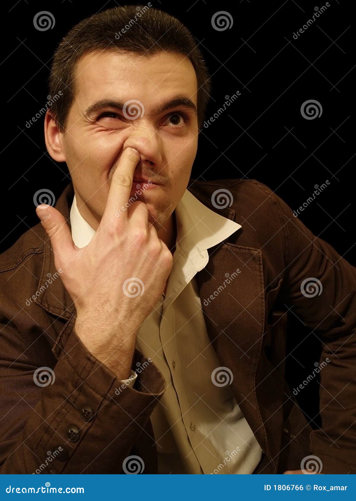 Digging in the nose stock photo. Image of brown, self - 1806766