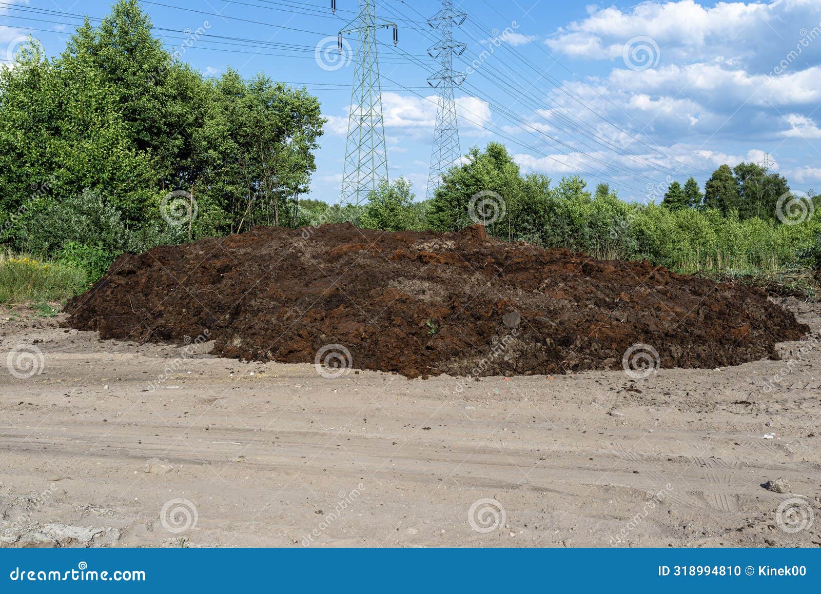 Digging Out Peat from Marshy Swamps, Visible Mountains Made of Peat ...