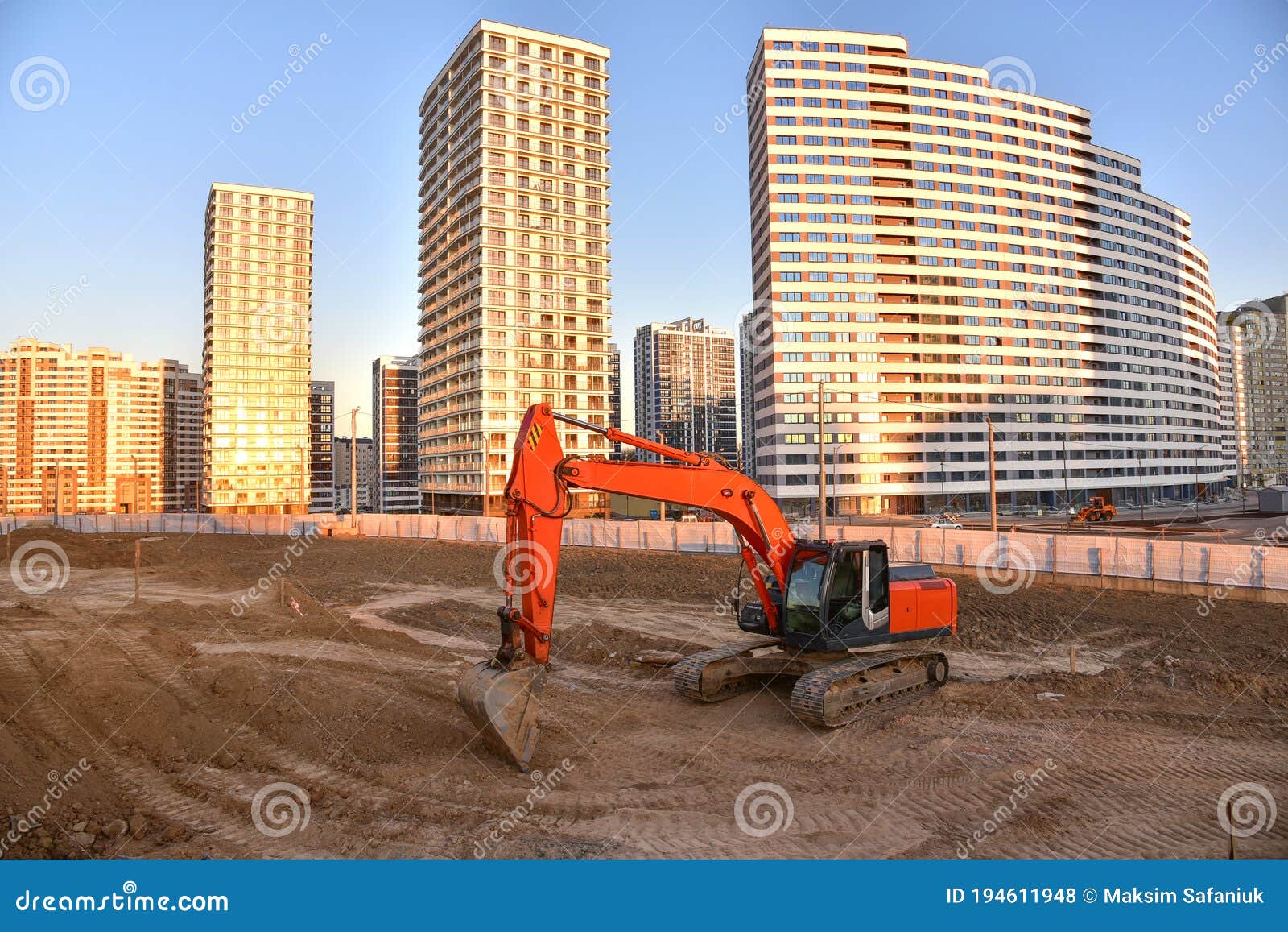 Digging the Pit Foundation a Hole with Excavator. Earthwork in ...