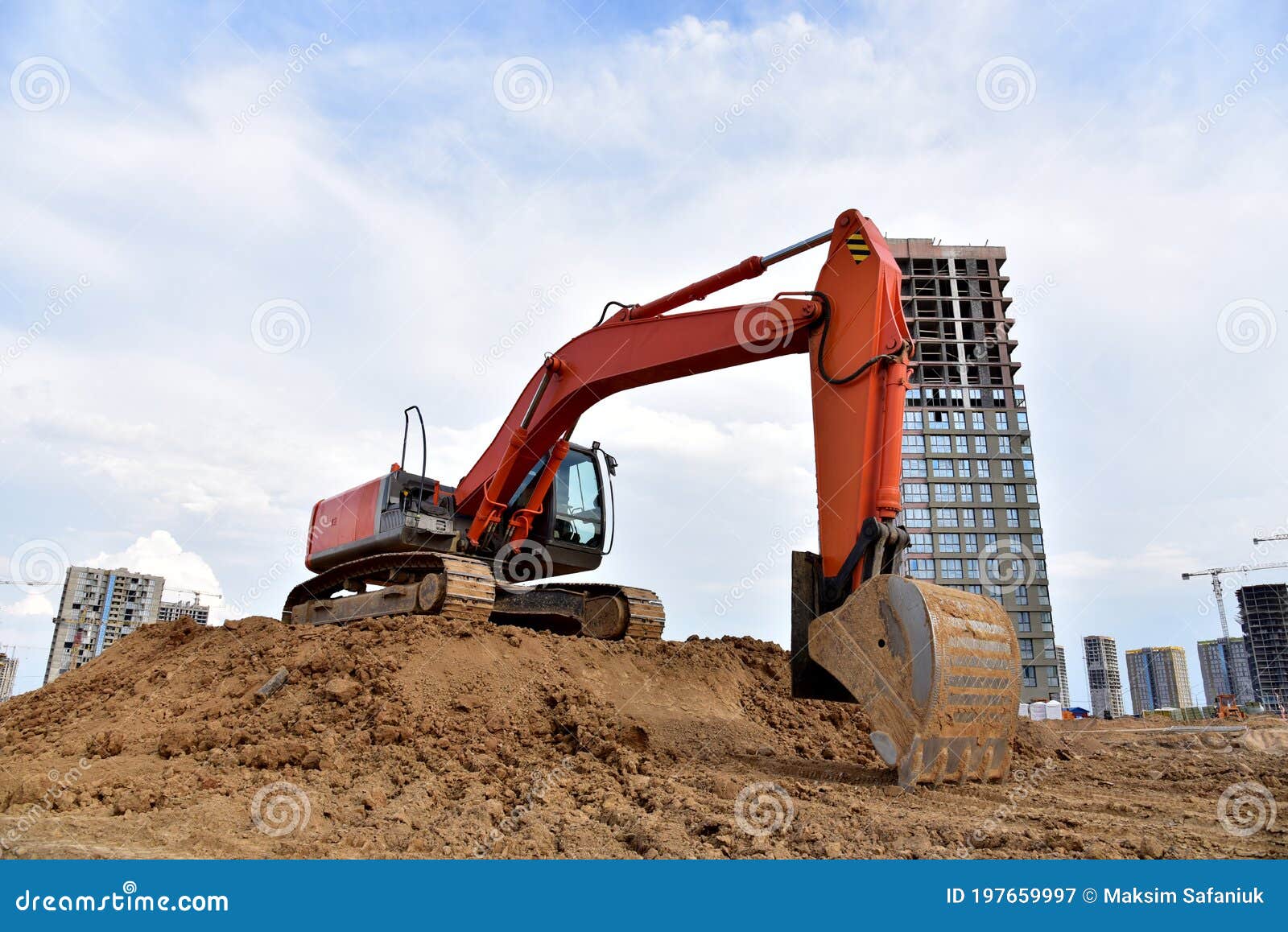 Digging the Pit Foundation a Hole with Excavator. Earthwork in ...