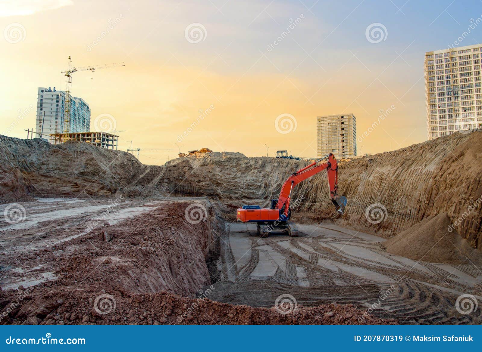 Digging the Pit Foundation a Hole with Excavator. Earthwork in ...
